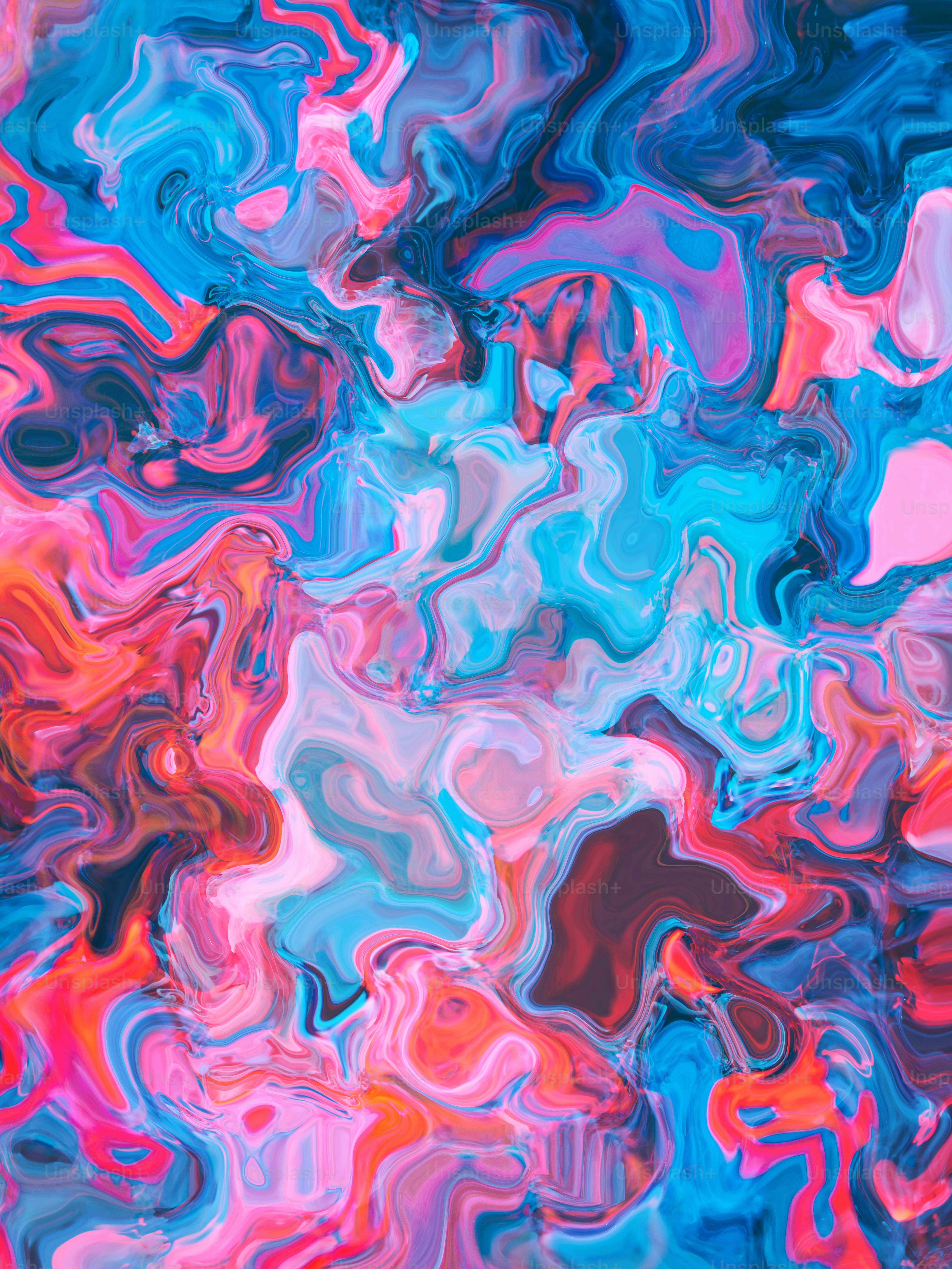 An abstract painting with blue, pink, and red colors photo ...