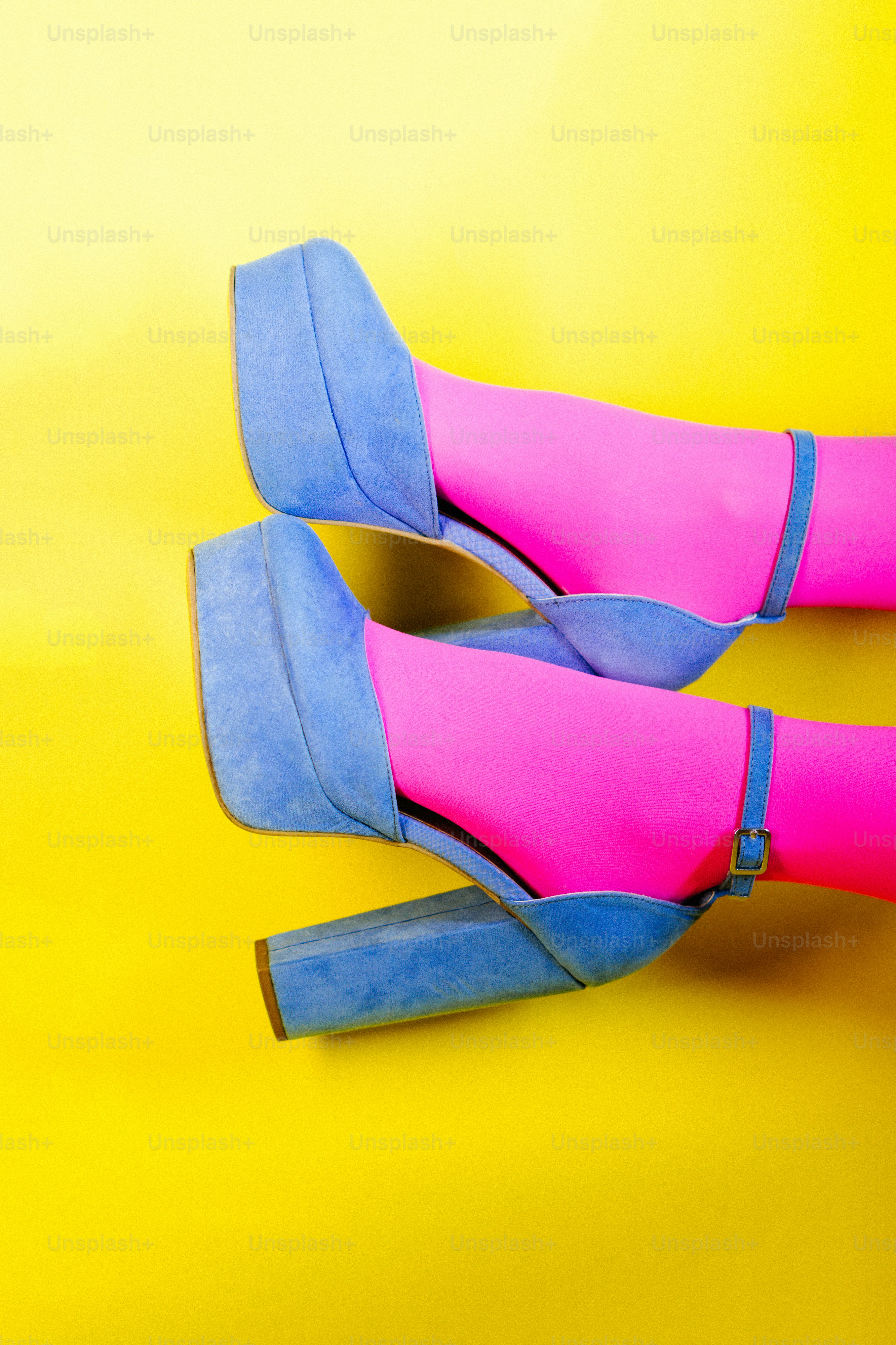 A woman's blue and yellow high heeled shoes photo – Fashion Image on ...