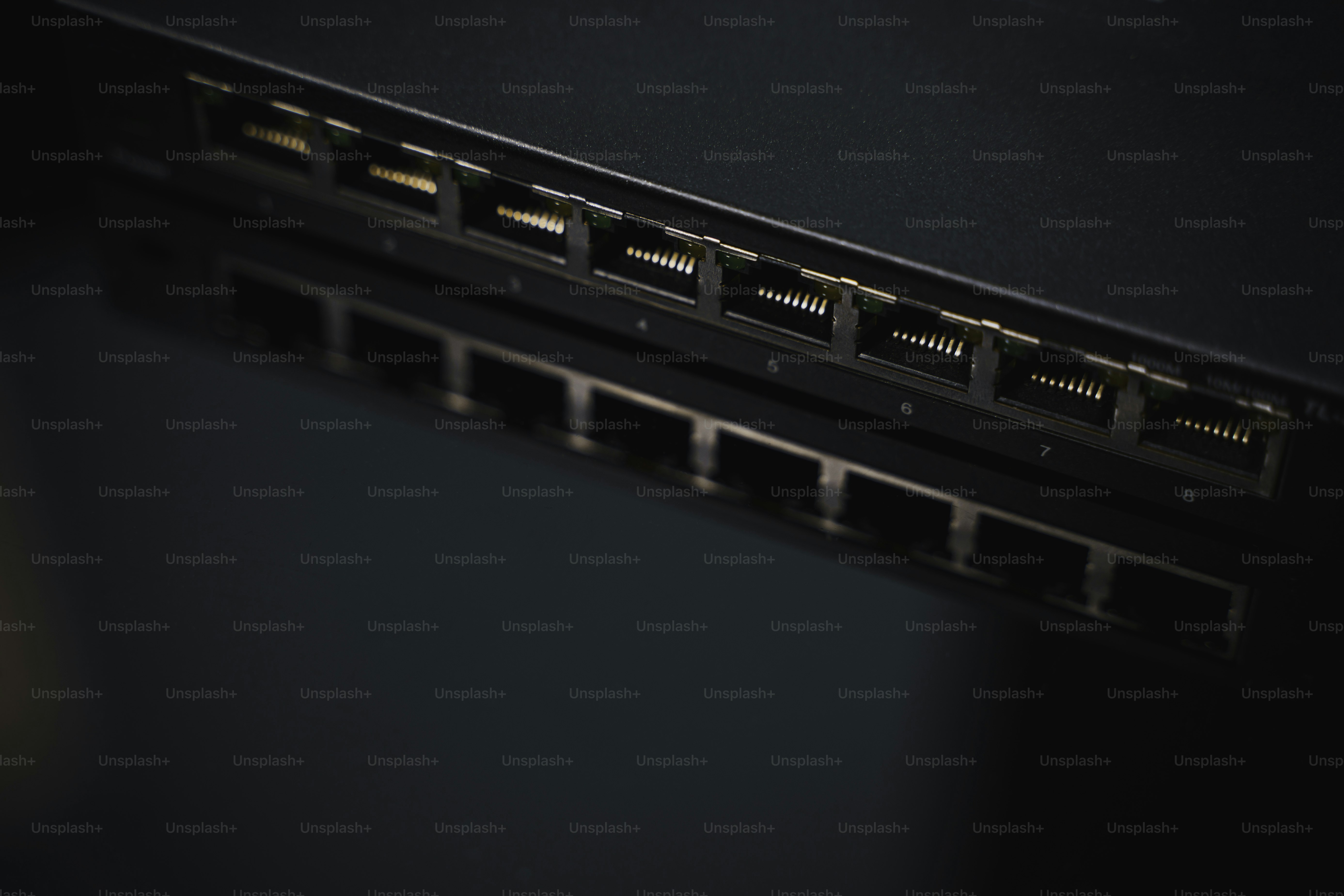 A close up of a router on a black surface photo – Router Image on Unsplash