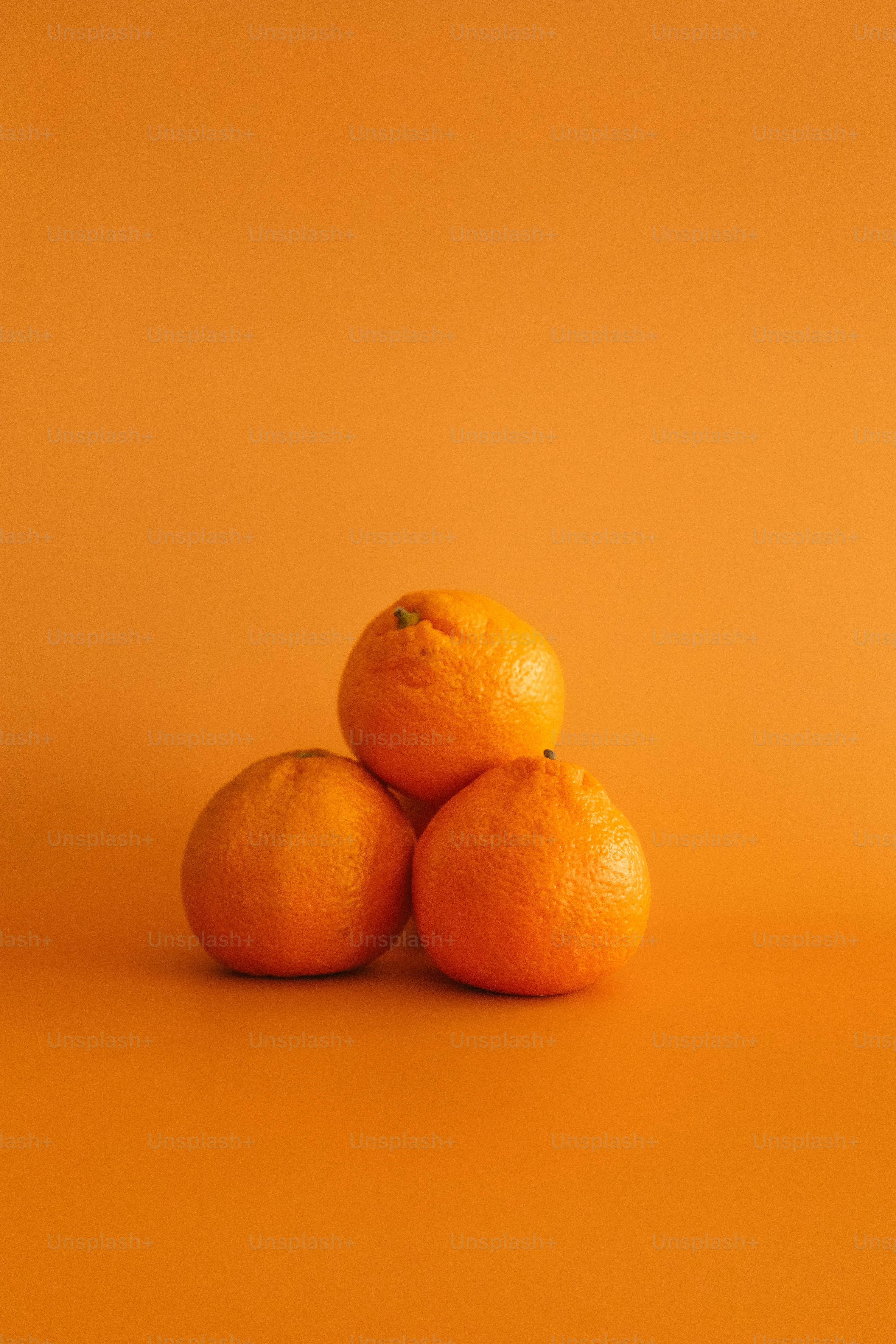 Three oranges sitting on top of each other photo – Fruits Image on Unsplash