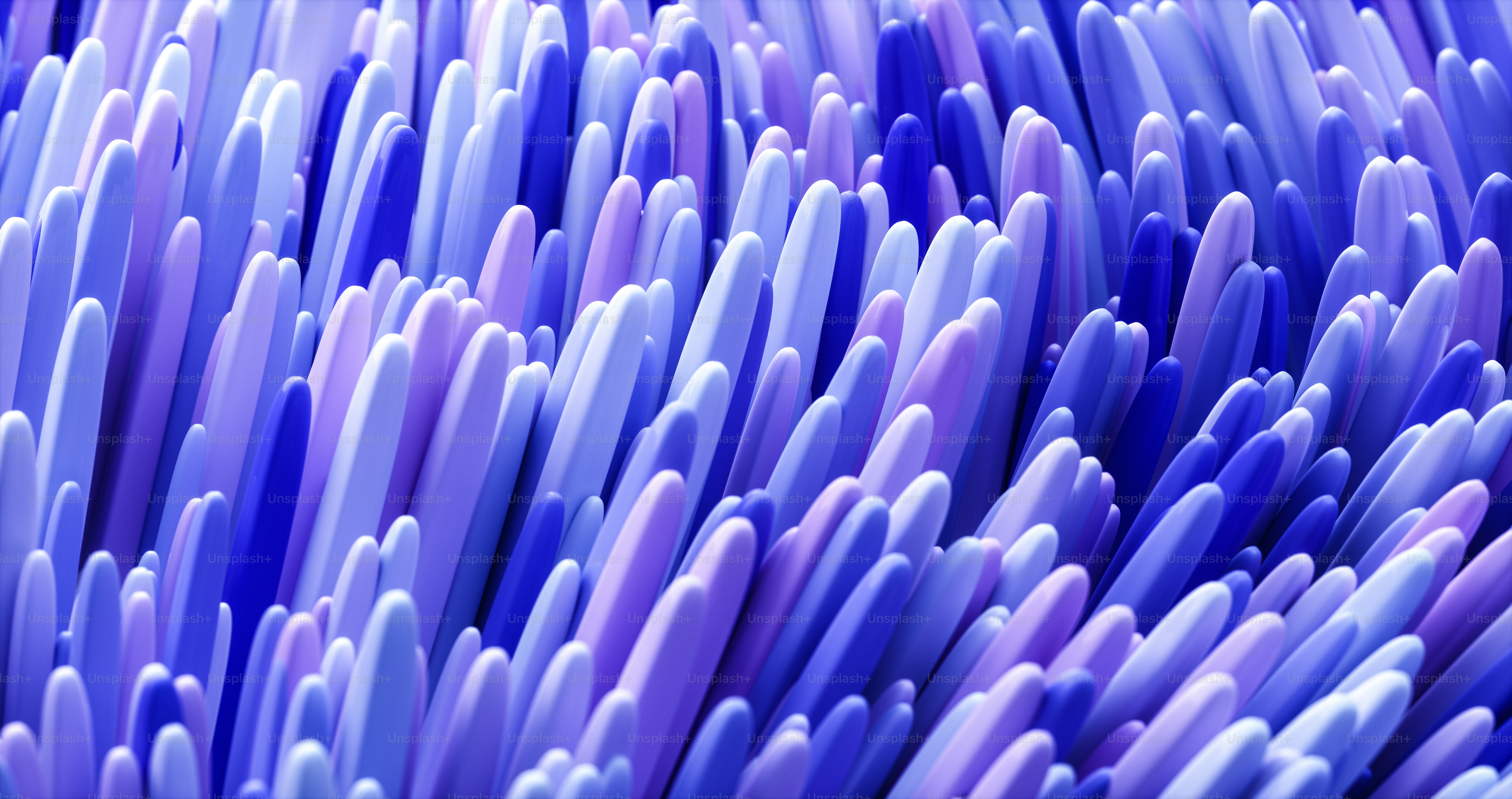 A bunch of blue toothbrushes are stacked together photo – Texture Image ...