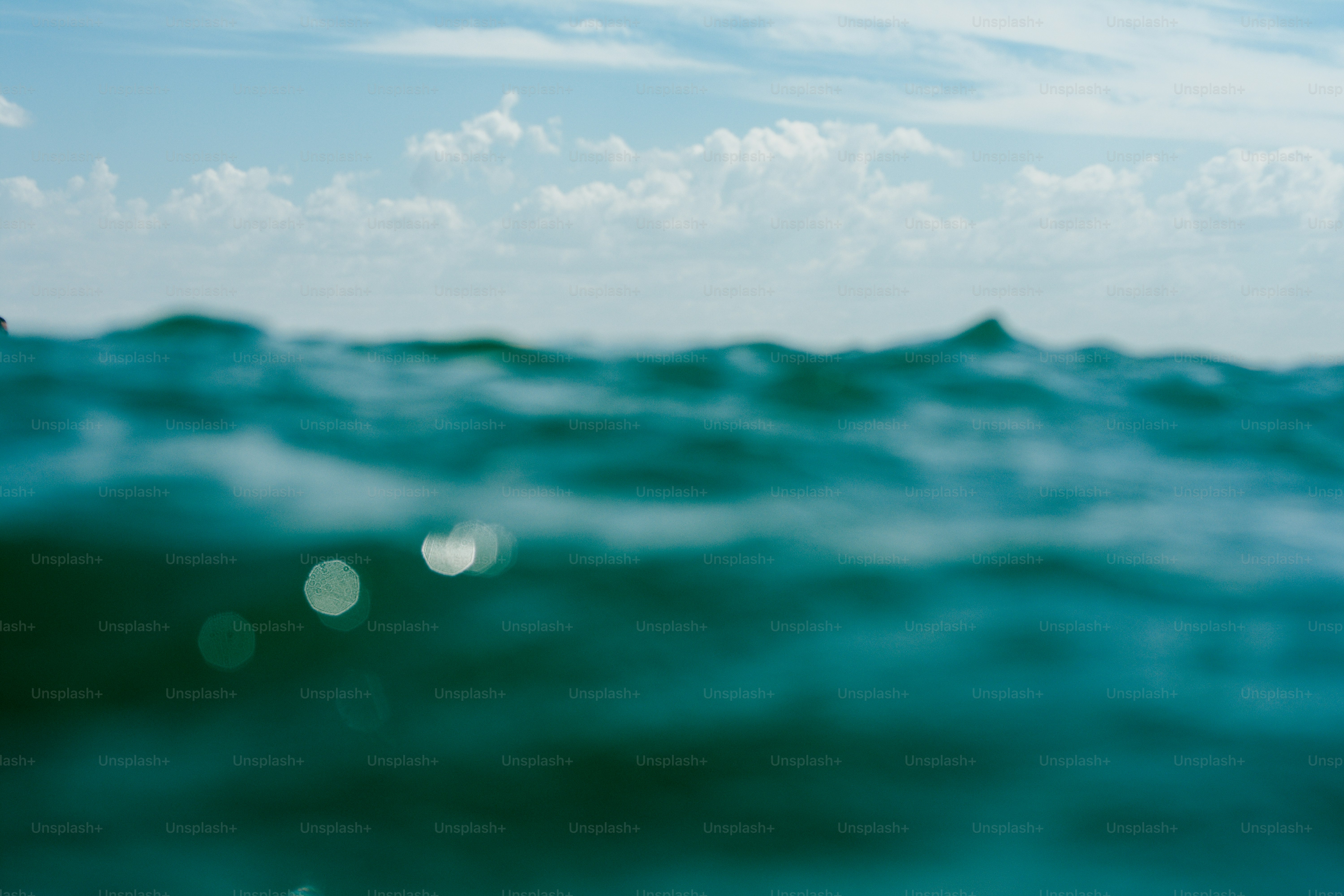 A blurry photo of the ocean and sky photo – Ocean sky Image on Unsplash