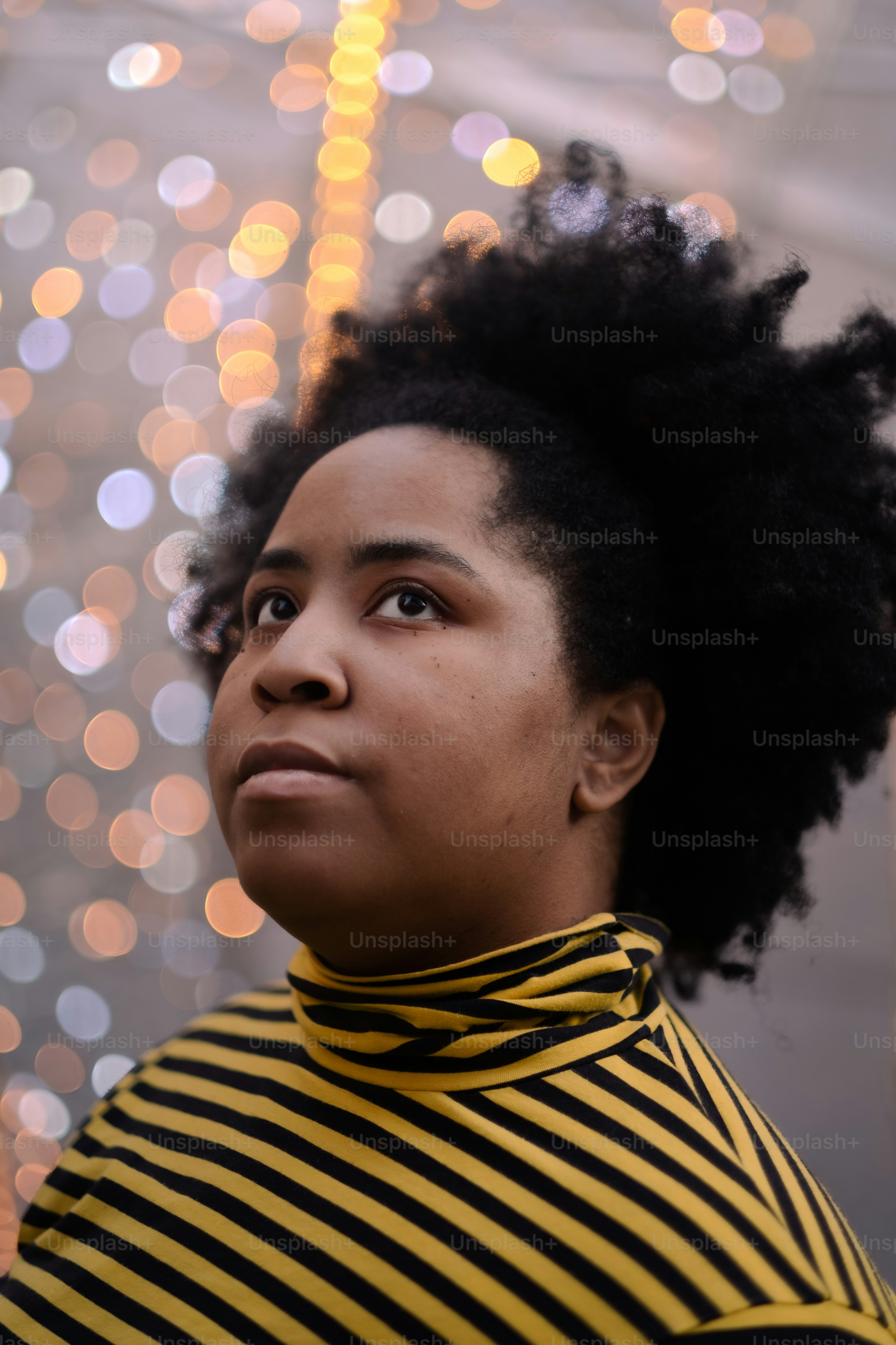 A close up of a person wearing a striped shirt photo – Los angeles ...