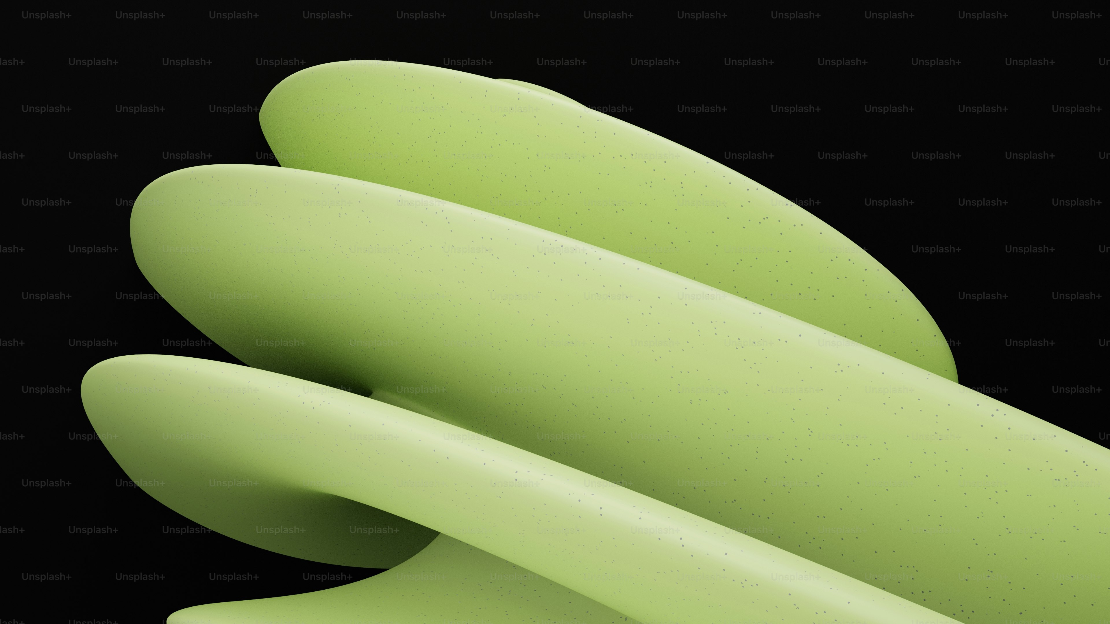 A close up of a green object on a black background photo – Wallpaper ...