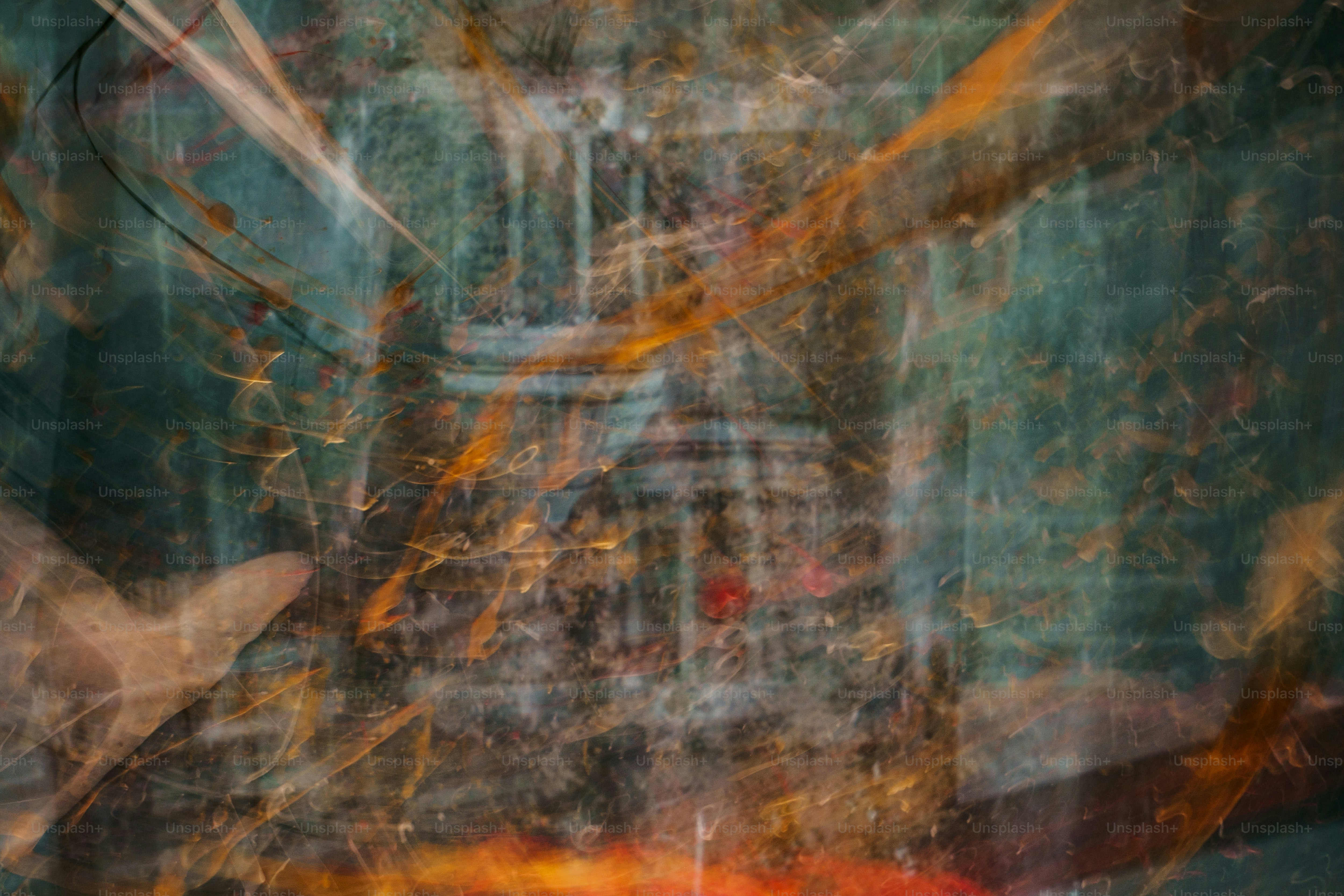 A blurry photograph of a clock tower photo – Wallpaper Image on Unsplash