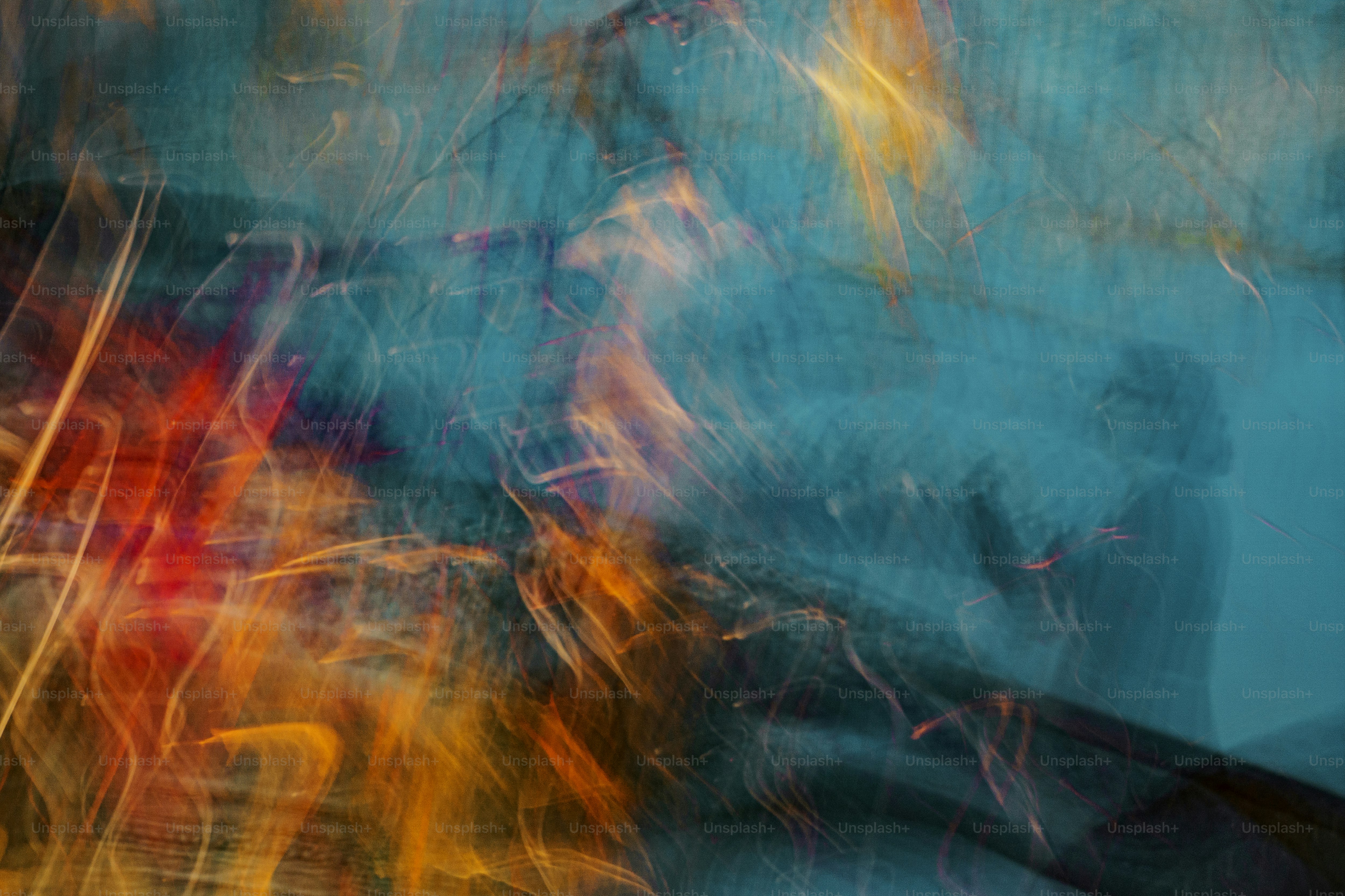 A blurry picture of a blue wall with a clock on it photo – Surrealism ...