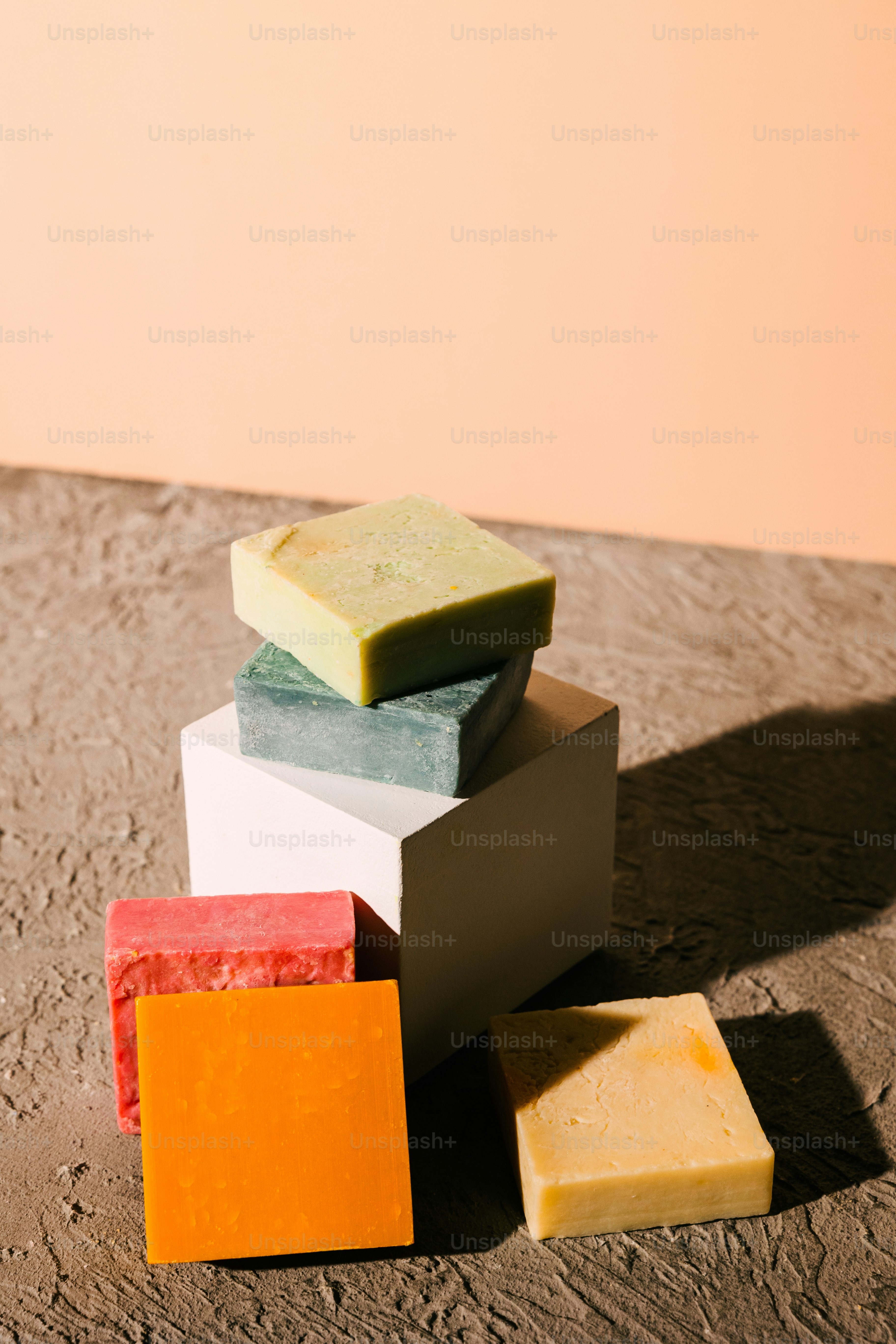 A stack of soap bars sitting on top of each other photo – Handmade soap ...