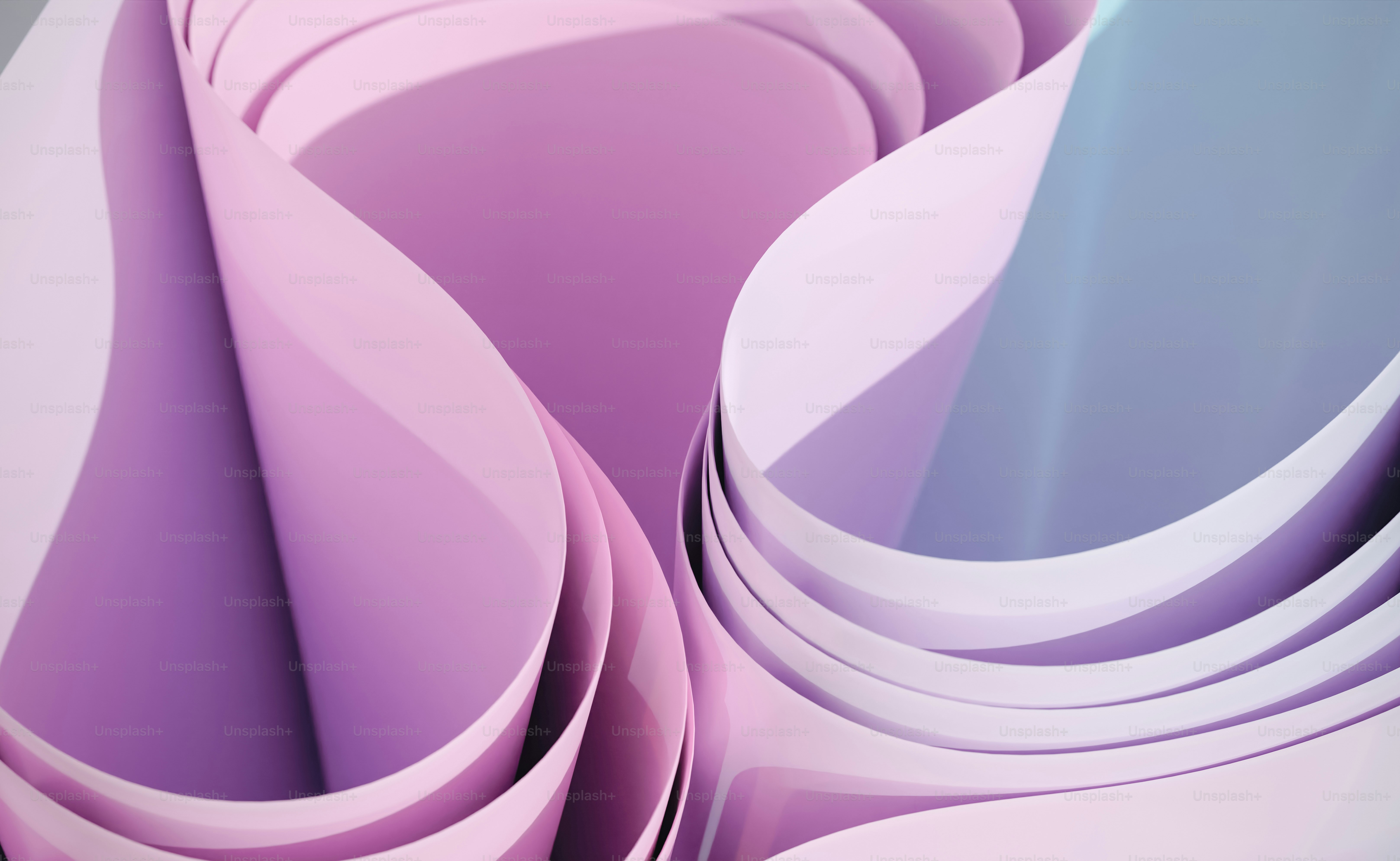 A close up of a stack of folded papers photo – Wallpaper Image on Unsplash