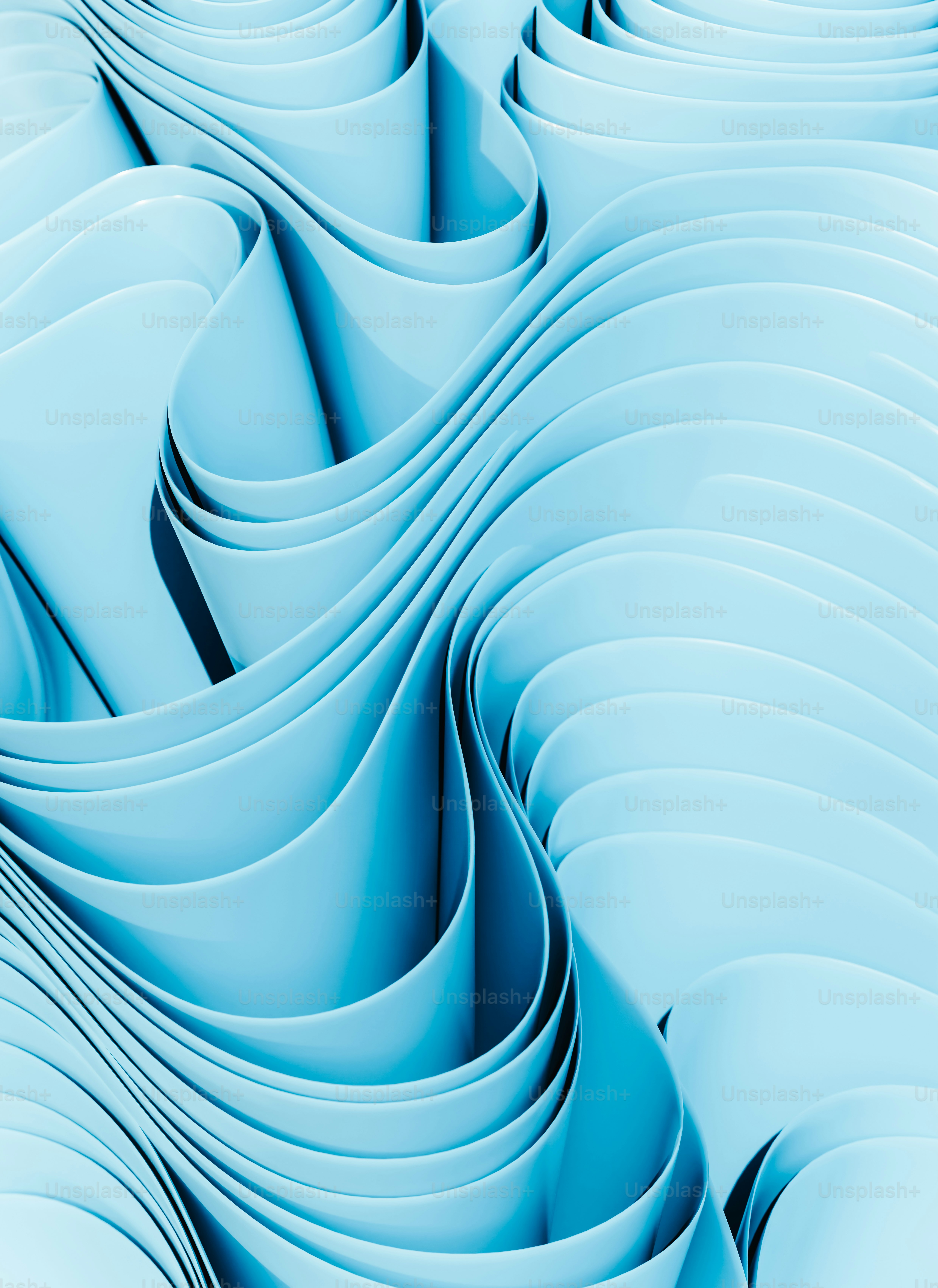 A large group of blue papers stacked on top of each other photo ...