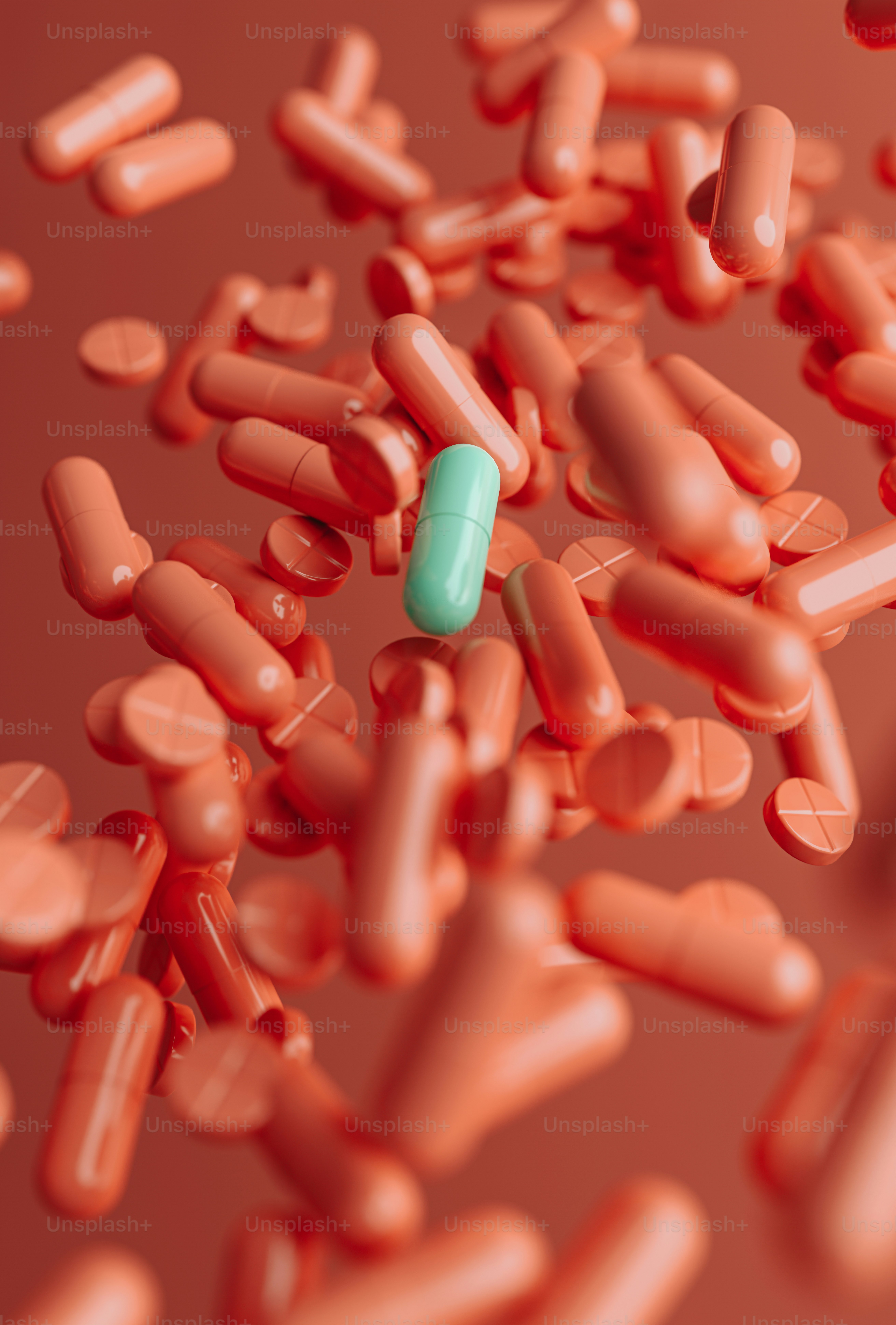 a group of pills scattered on top of each other photo – Image on Unsplash