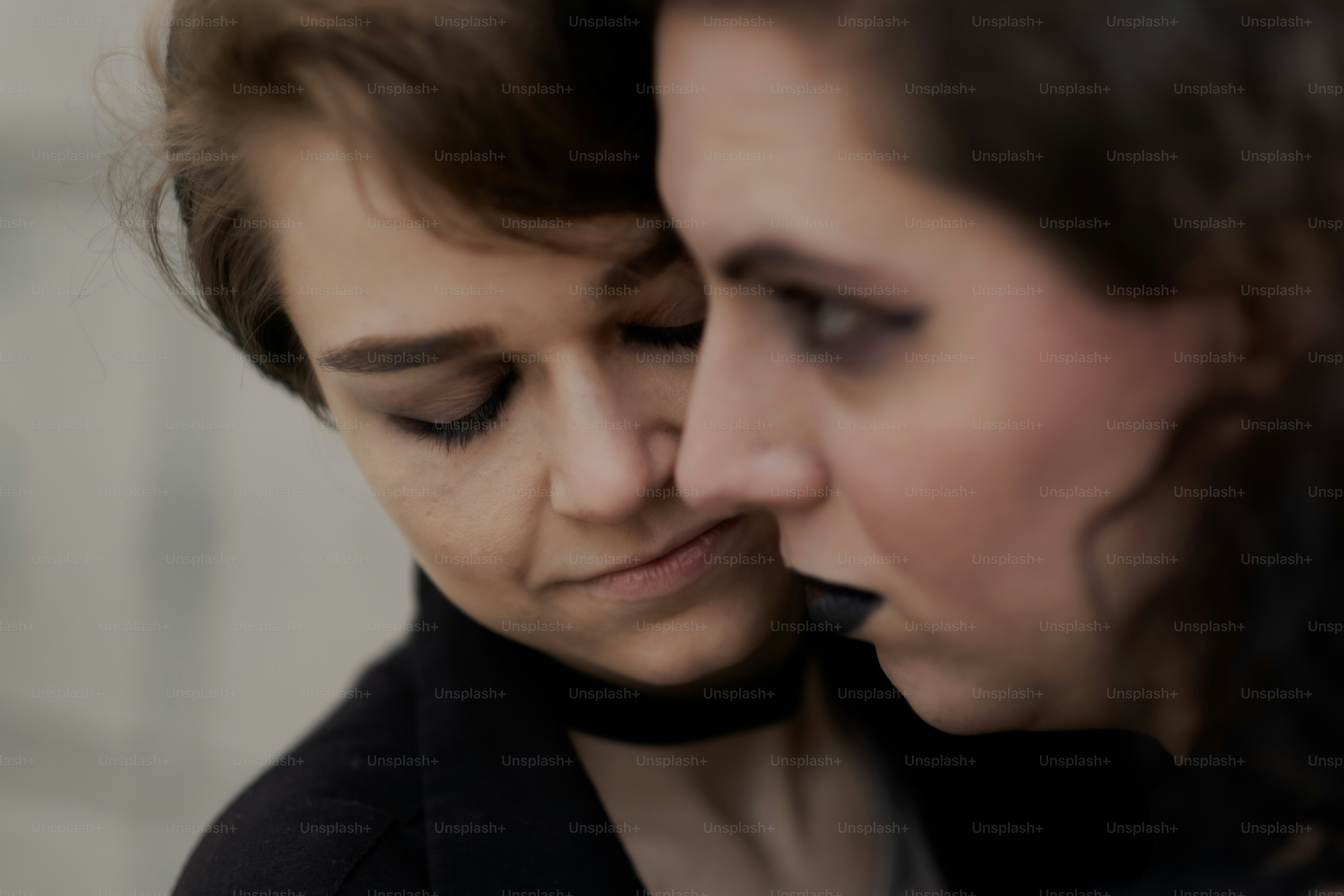 A close up of two people touching each other photo – People Image on ...