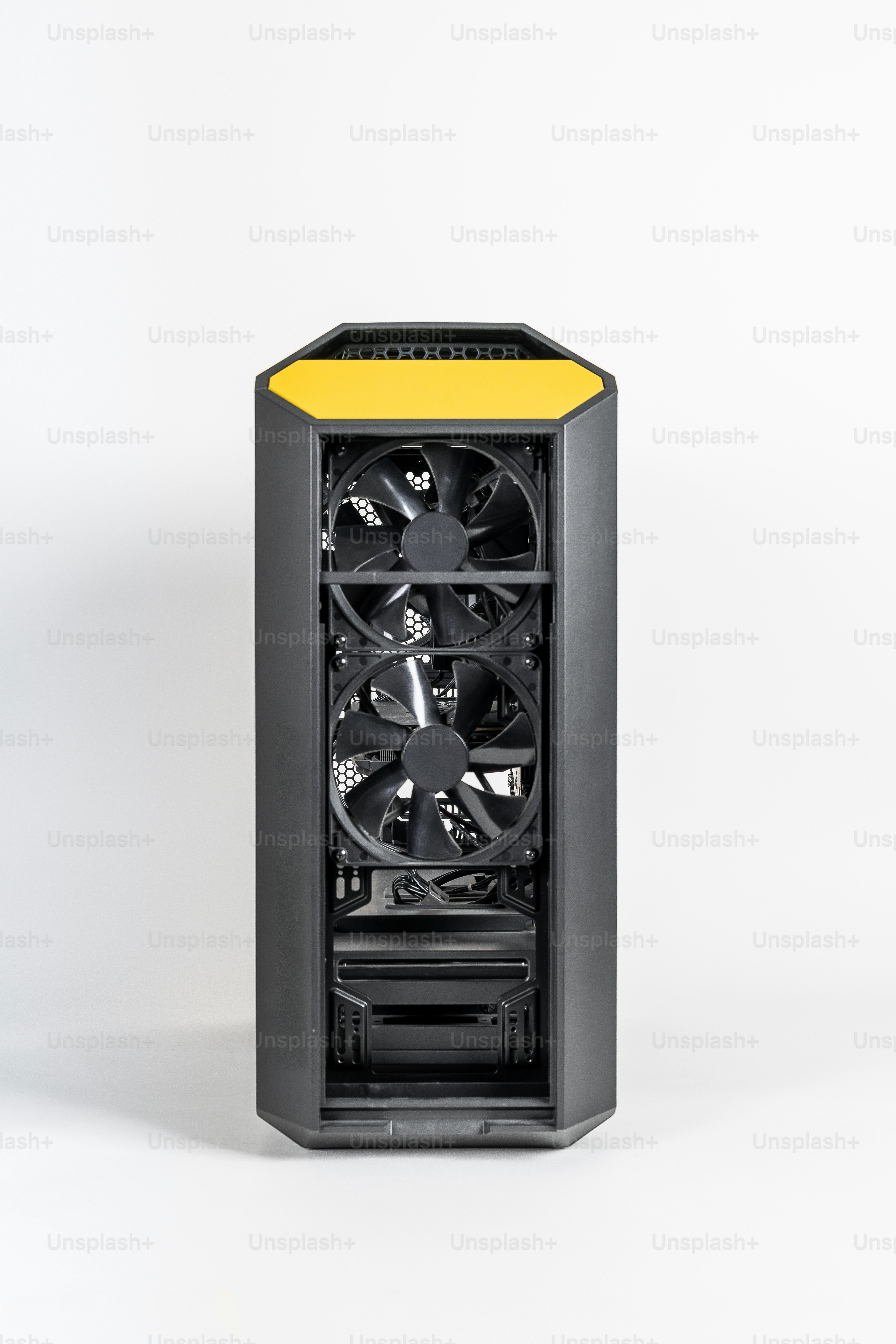 A black and yellow computer case on a white background photo – Hardware ...