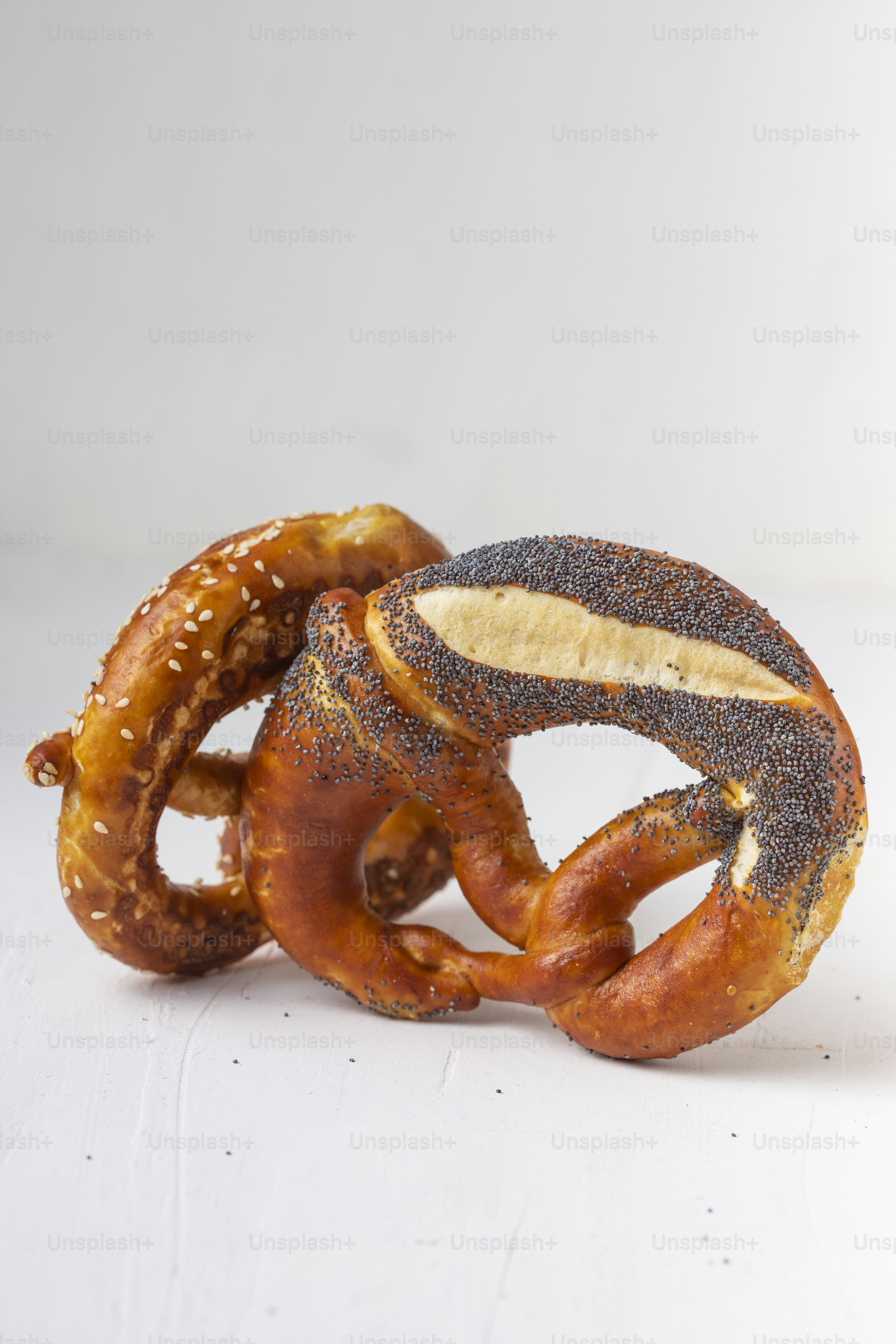 A couple of pretzels sitting on top of each other photo – Pretzel Image ...