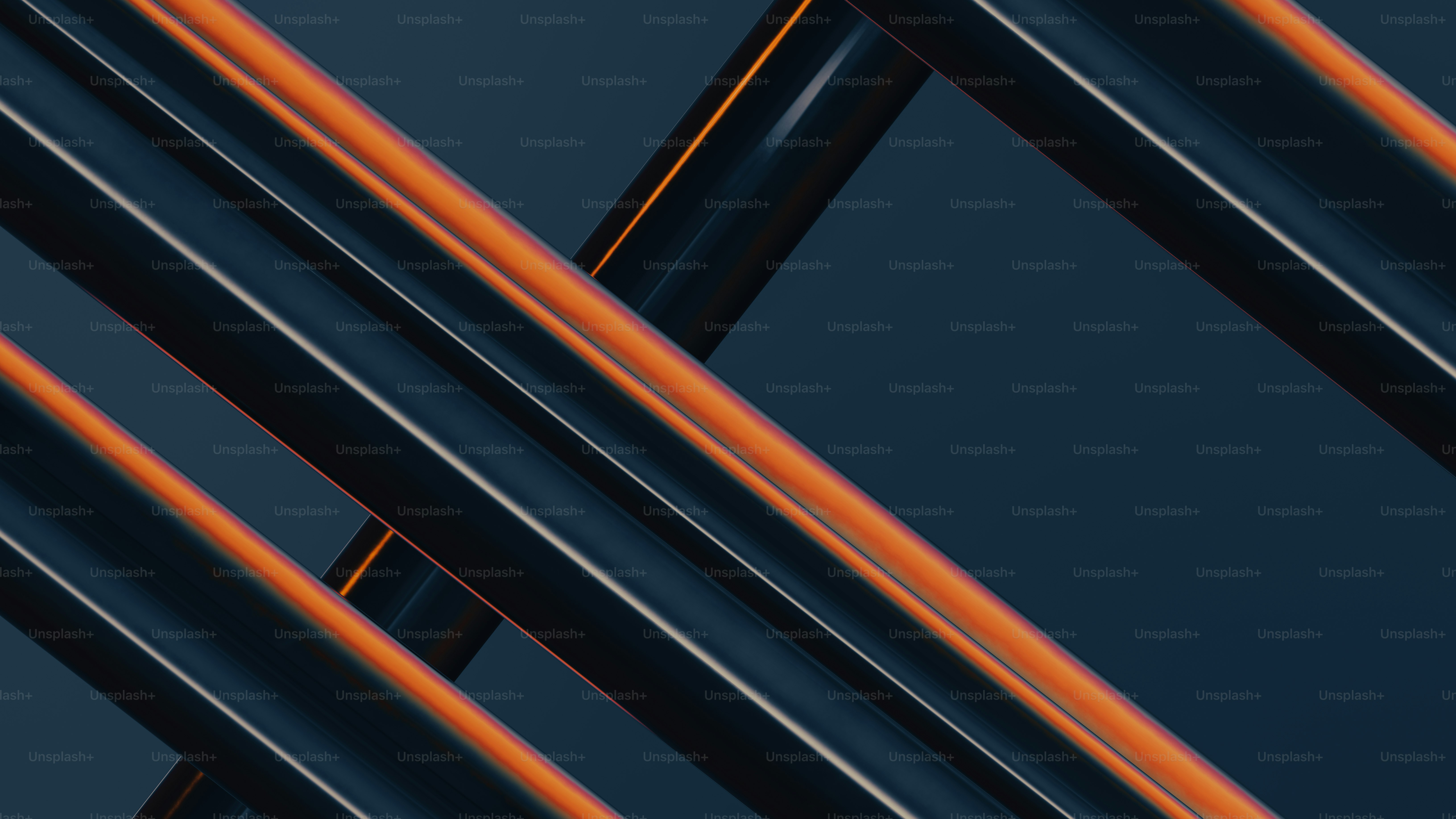 A group of orange and black metal pipes photo – Background Image on ...