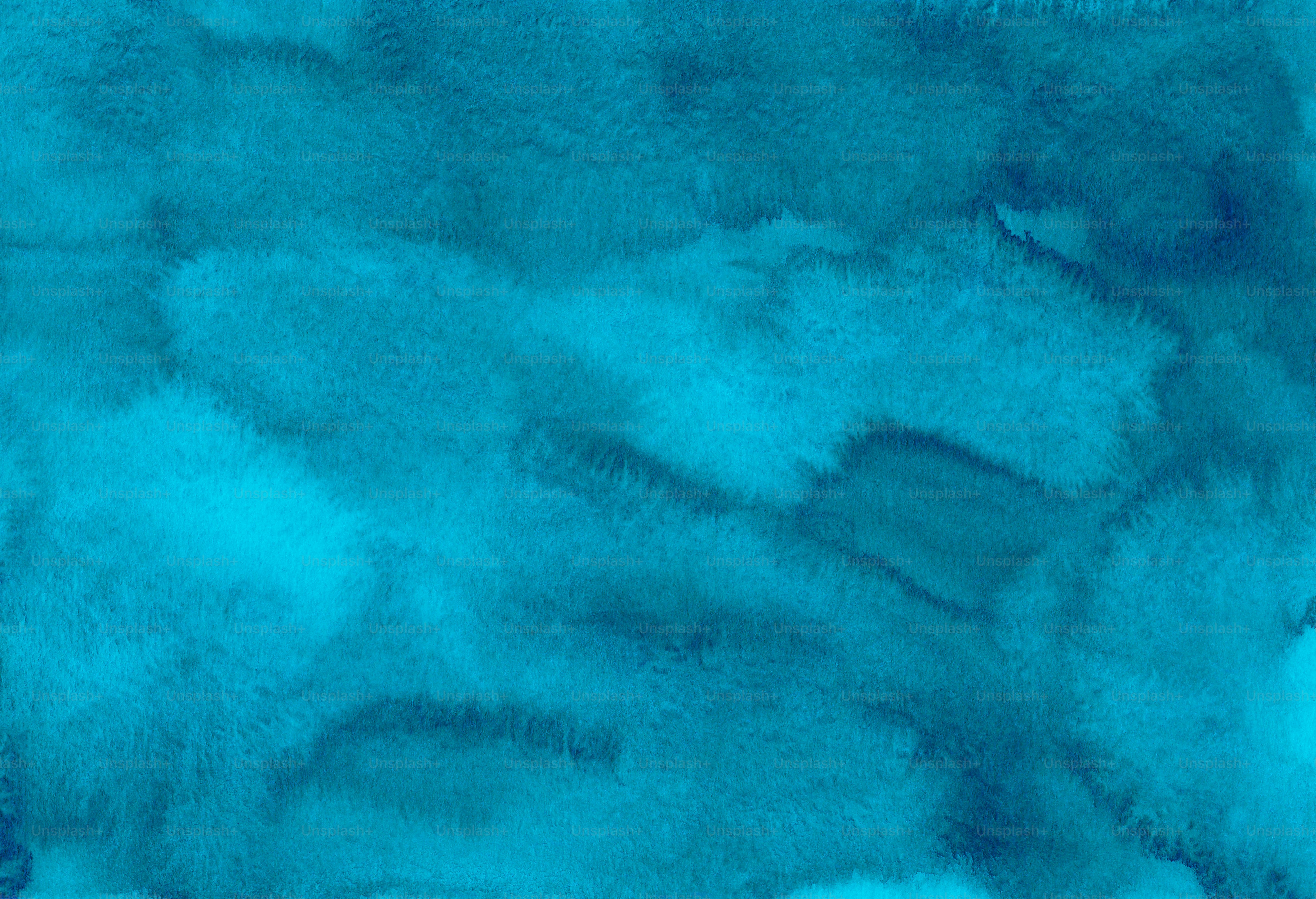 A blue square painted with watercolors on a white background photo ...