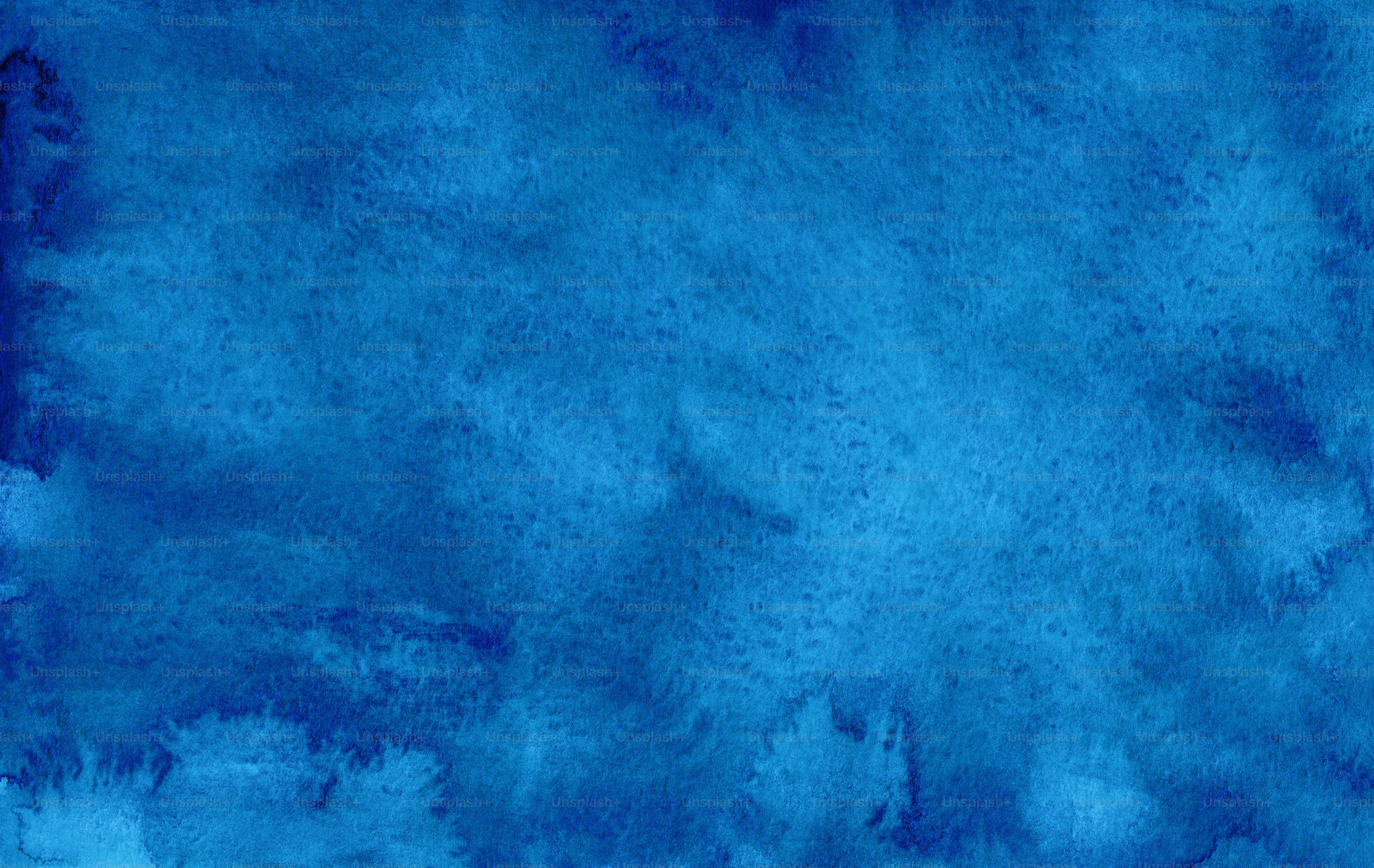 A blue square painted with watercolors on a white background photo ...