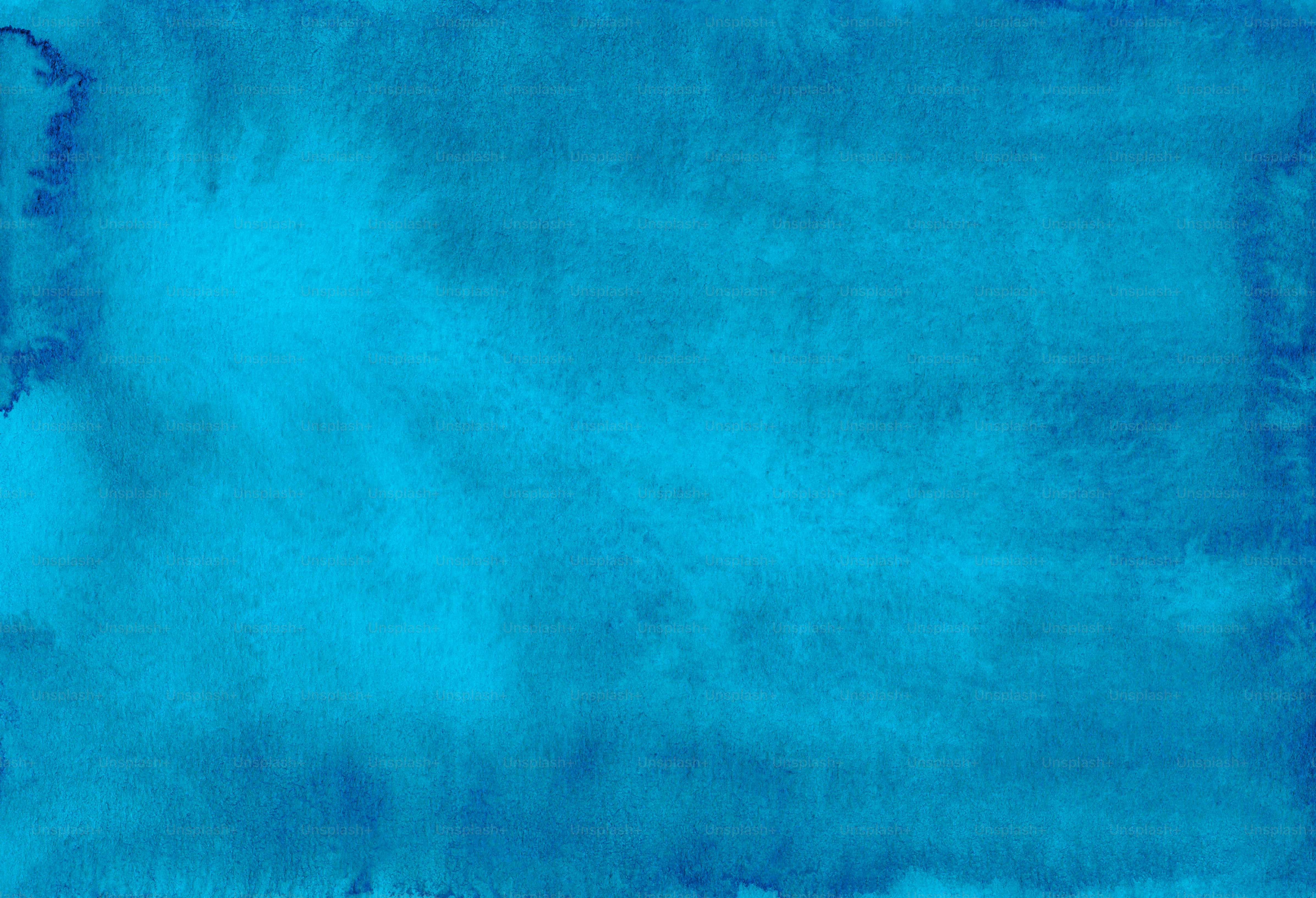 A blue square painted with watercolors on a white background photo ...