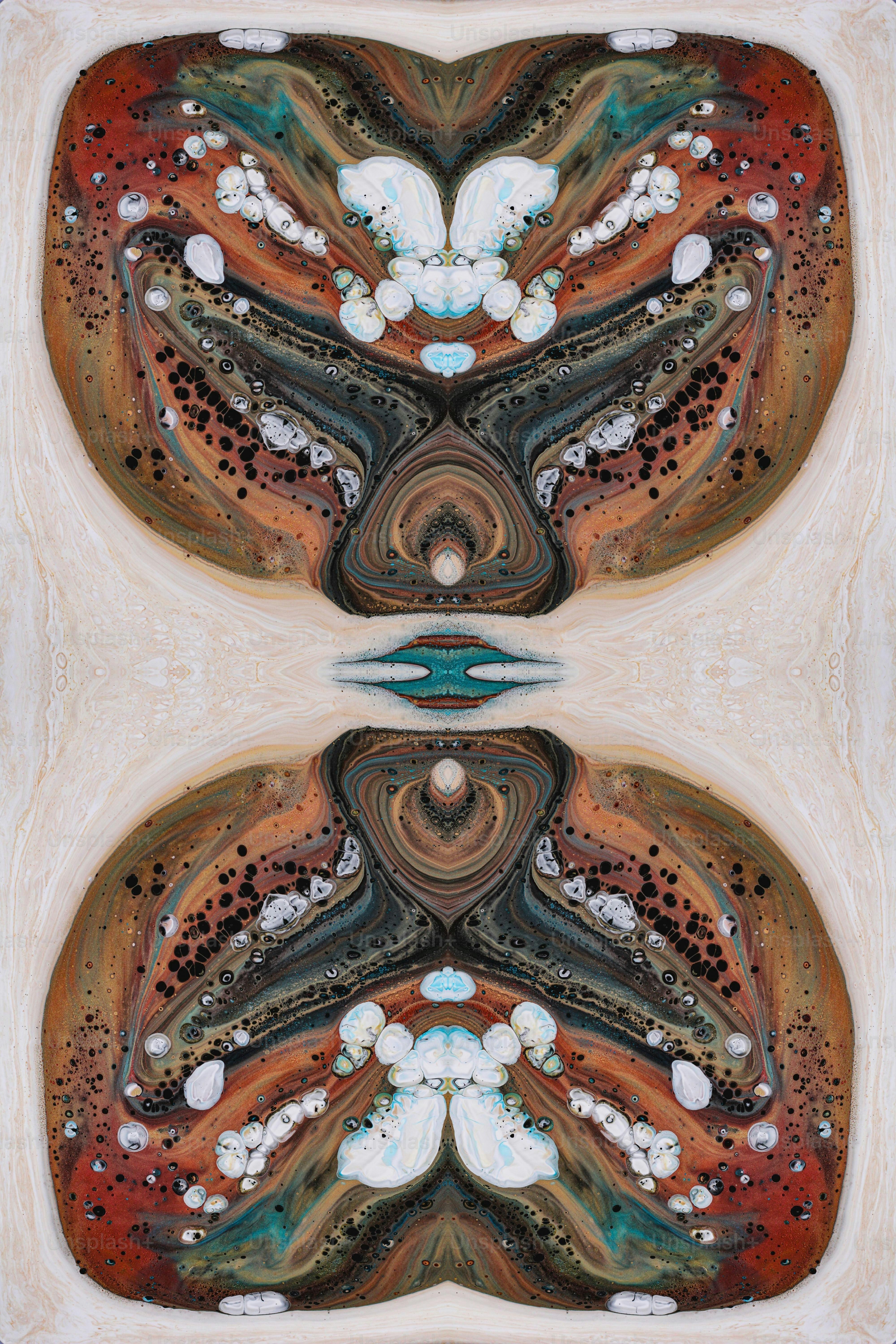 A picture of a painting with a lot of colors photo – Paint pouring ...