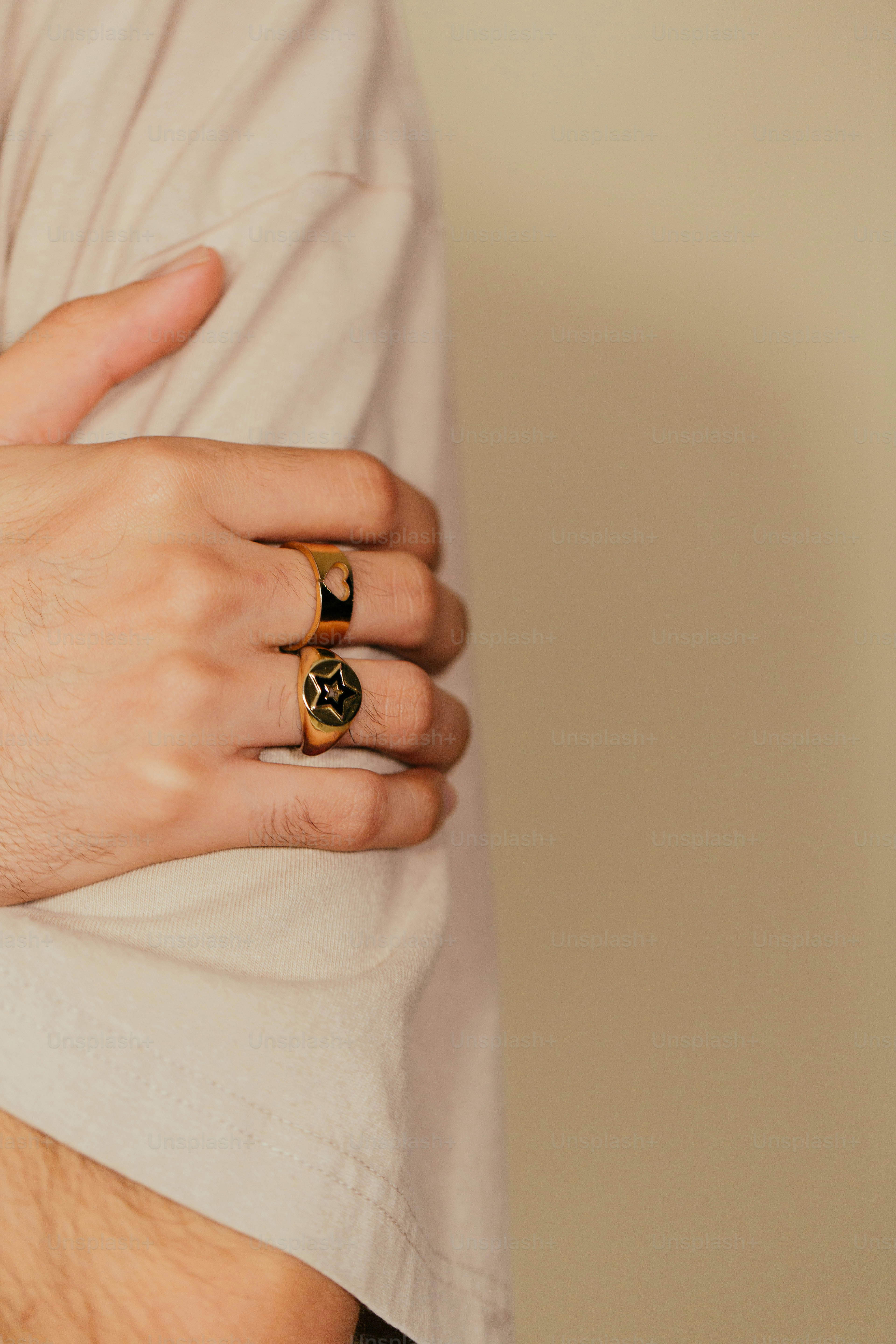 A man with a necklace on his neck photo – Face Image on Unsplash