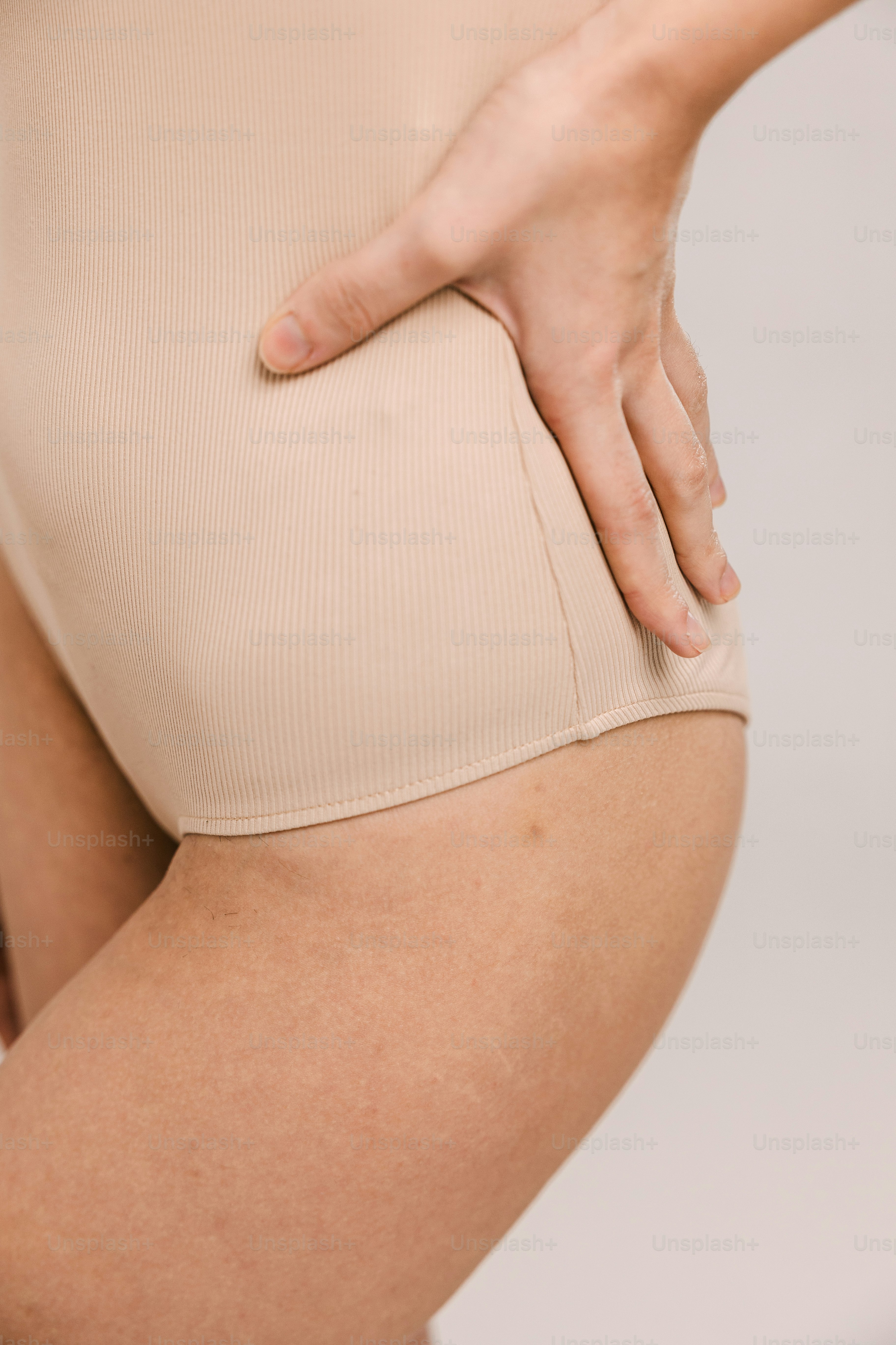 A woman's butt showing her lower body photo – Joints Image on Unsplash