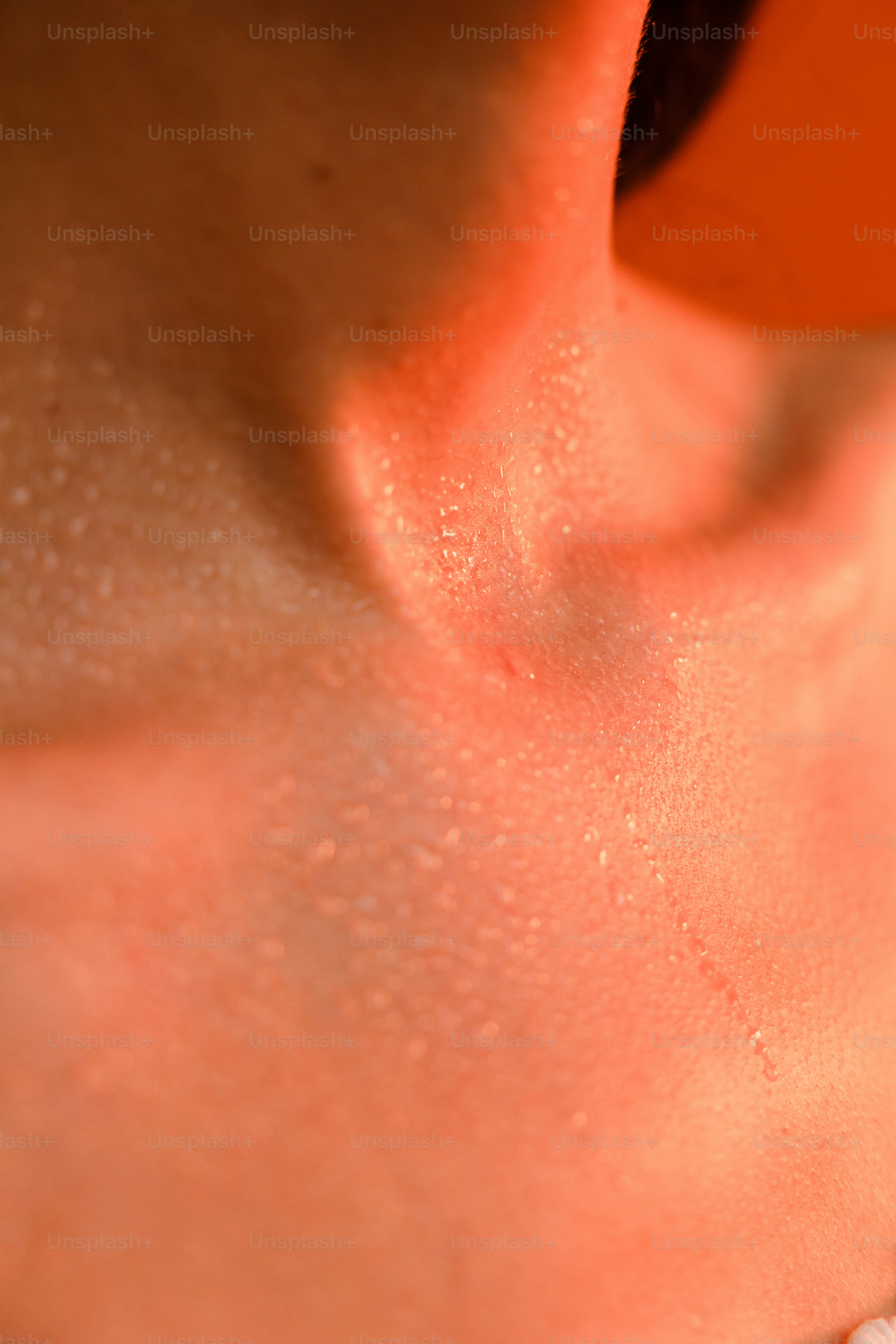 A close up of a person's neck and neck photo – Sweaty Image on Unsplash
