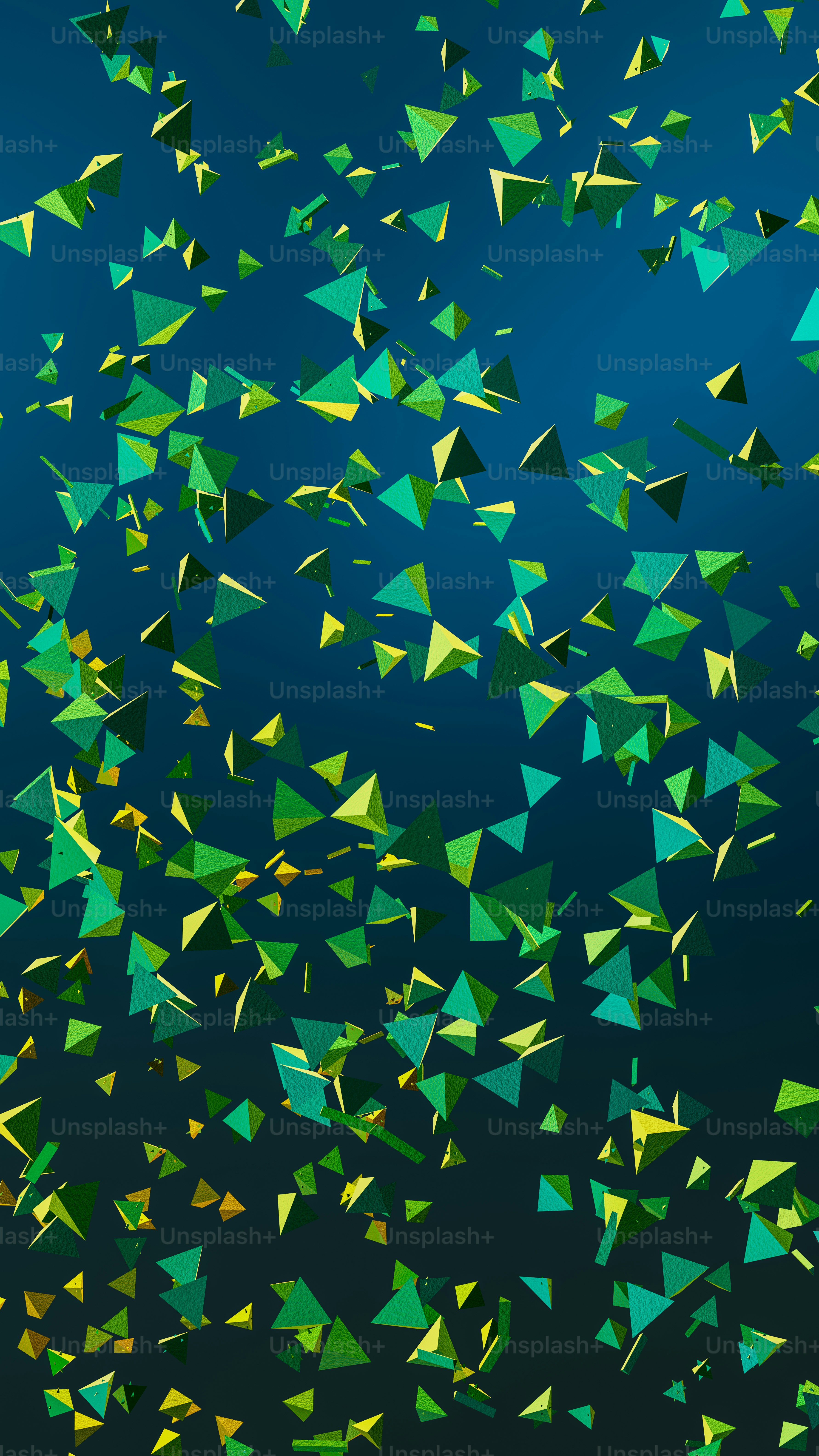 A group of green and yellow triangles flying in the air photo – Shapes ...