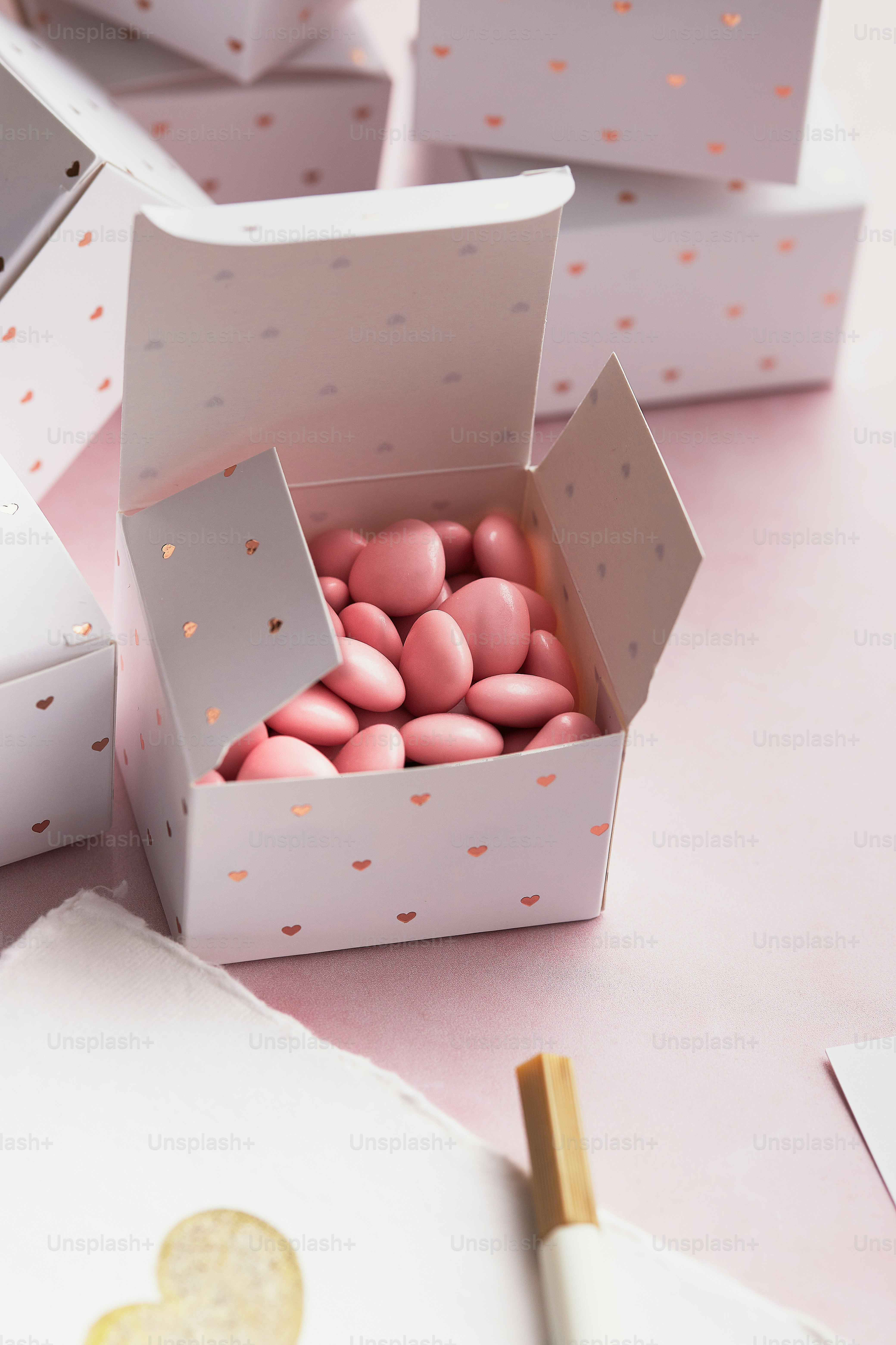 A couple of boxes that have some candy inside of it photo – Sweets ...