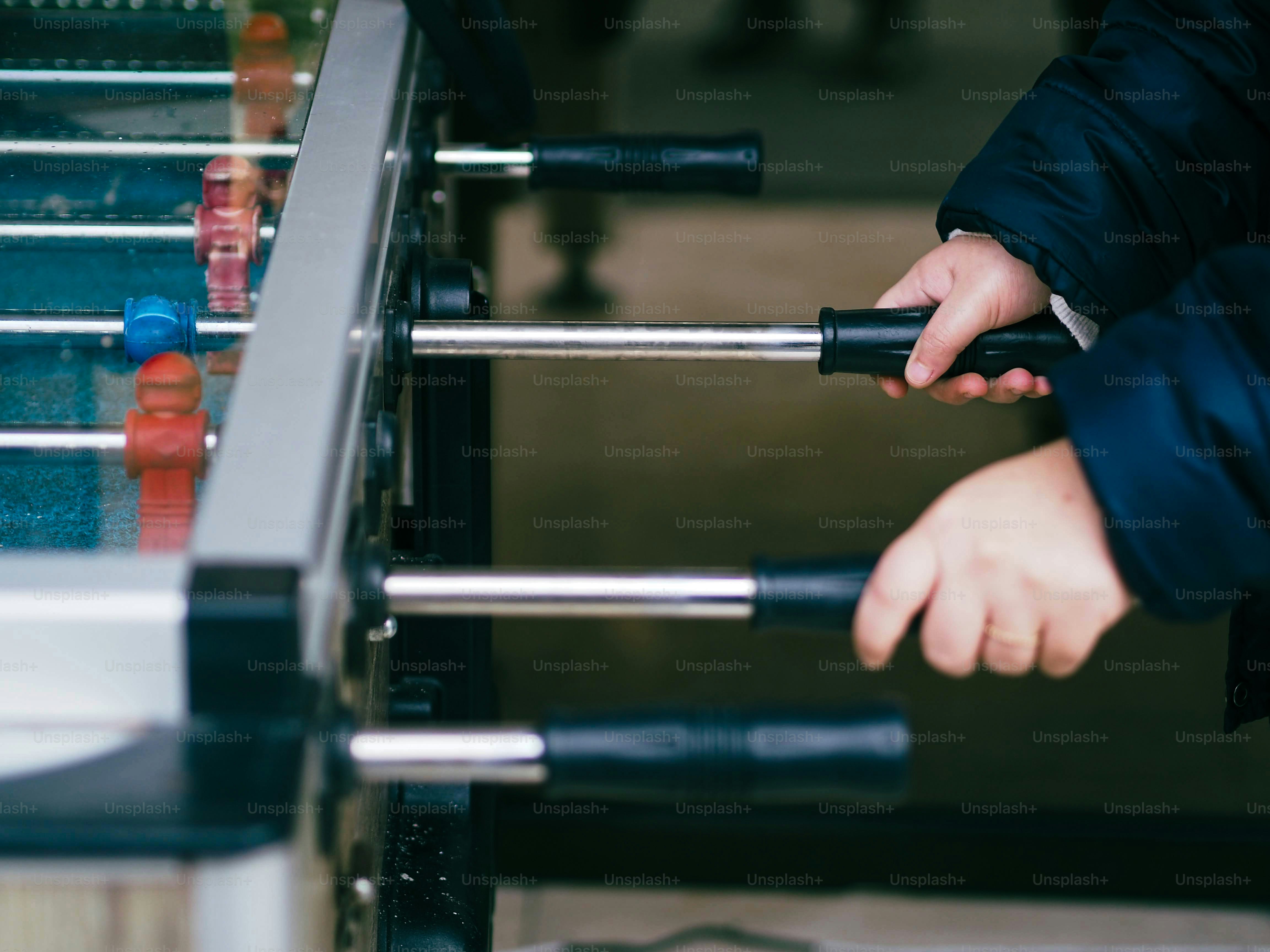 A close up of a person pulling something out of an oven photo ...