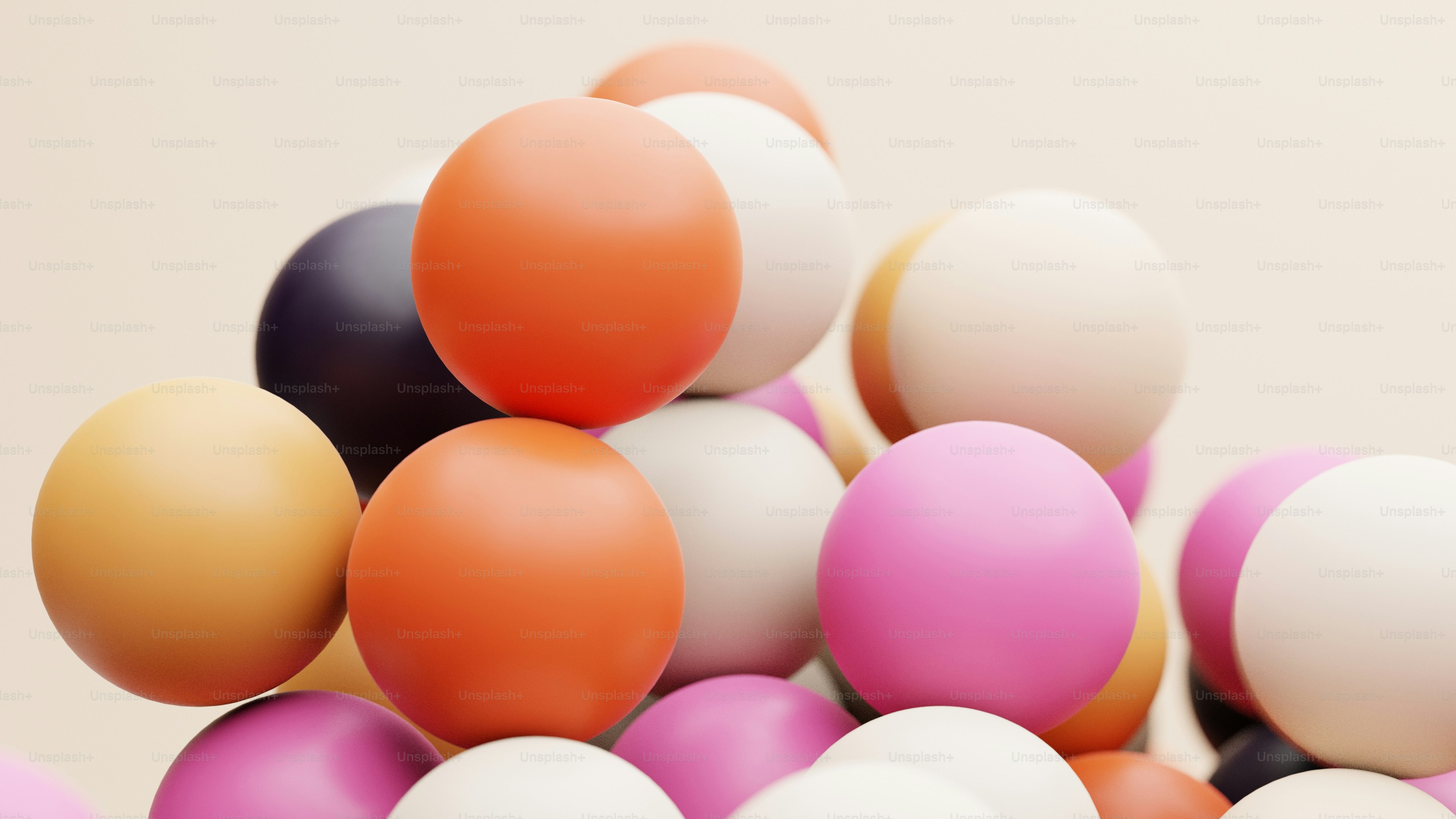 A pile of colorful balls sitting on top of each other photo – 3d Image ...