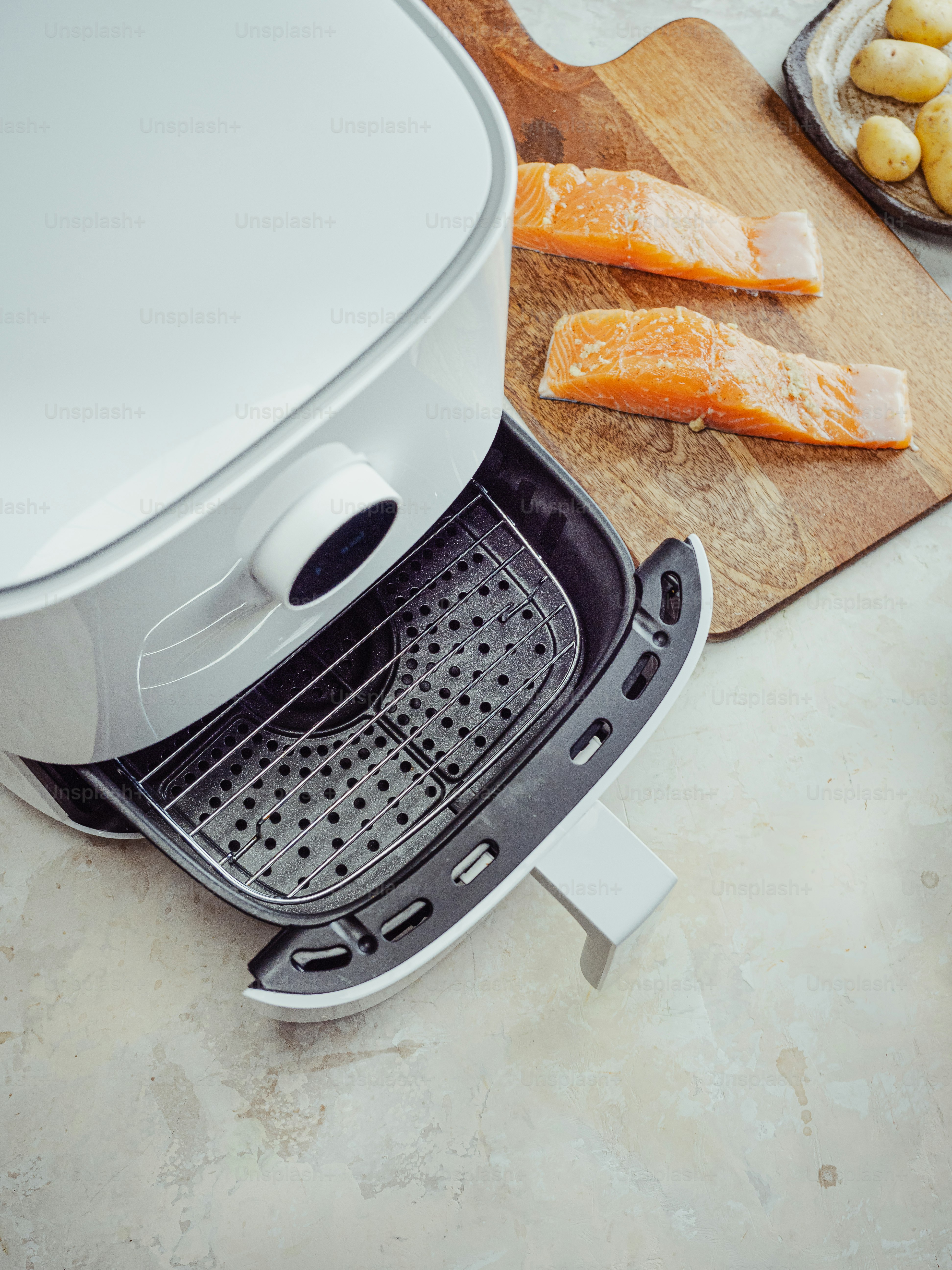 A close up of a food processor on a table photo – Air fryer Image on ...