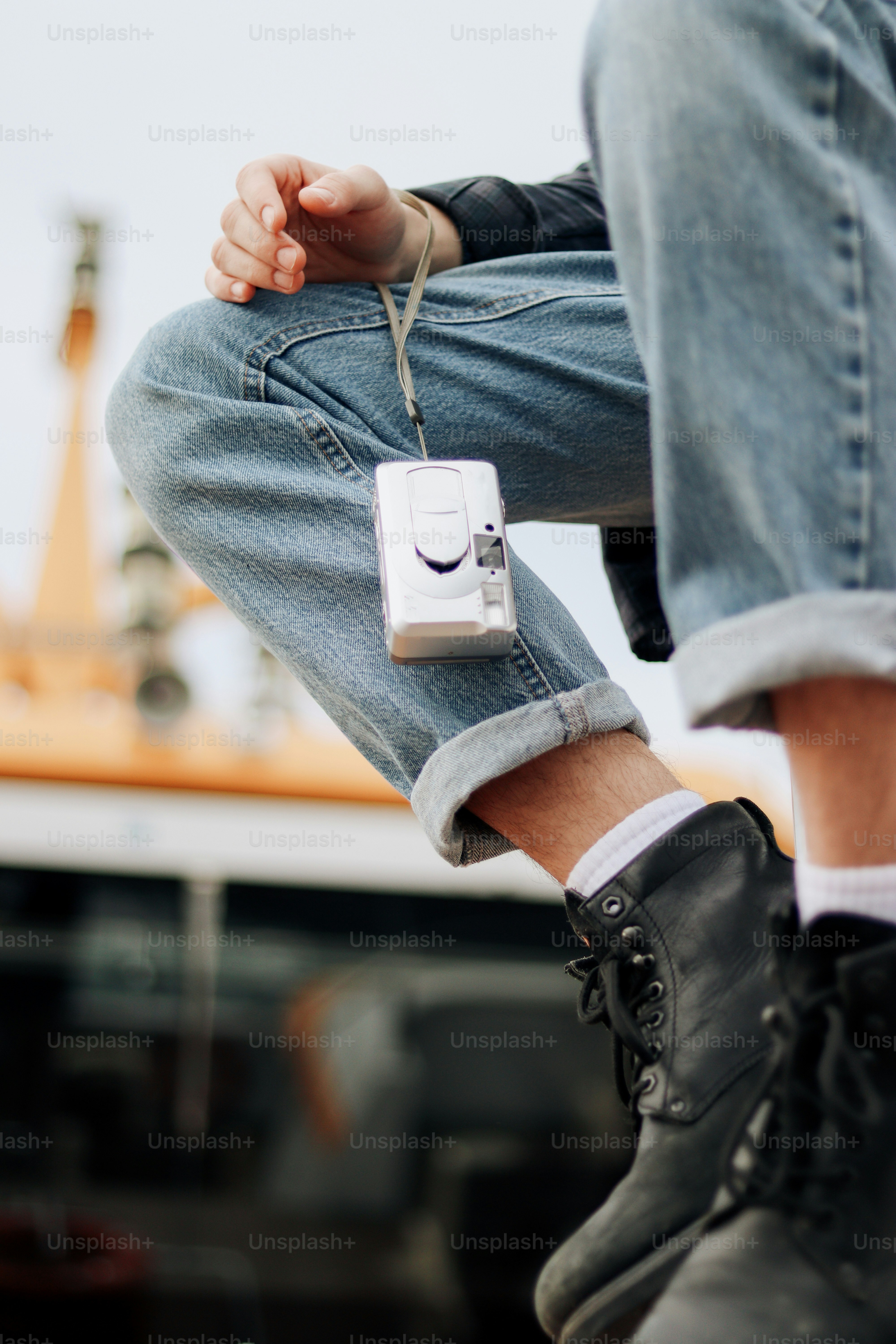 A man wearing glasses looking off into the distance photo – Young men ...