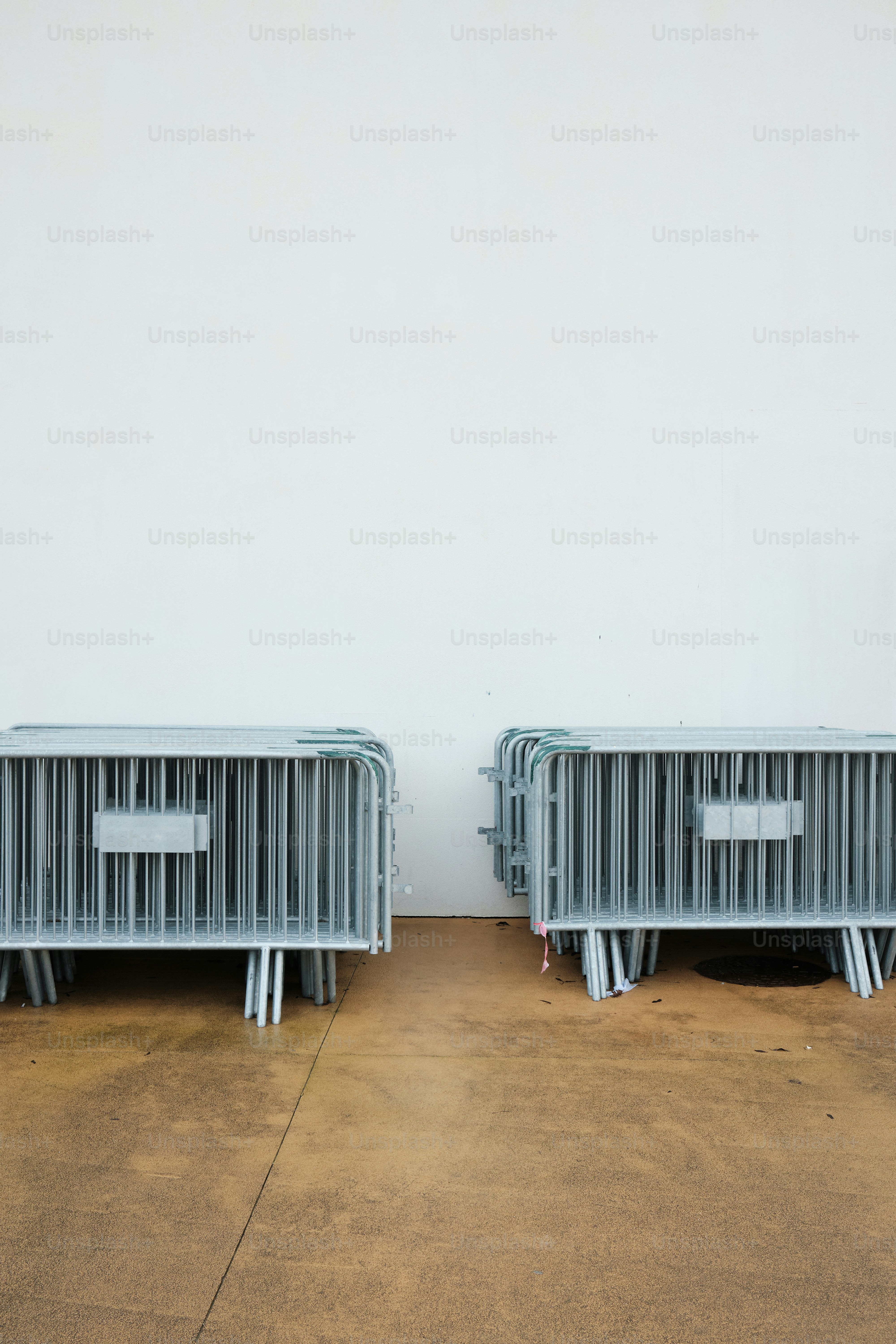 A couple of metal containers sitting next to each other photo – City ...