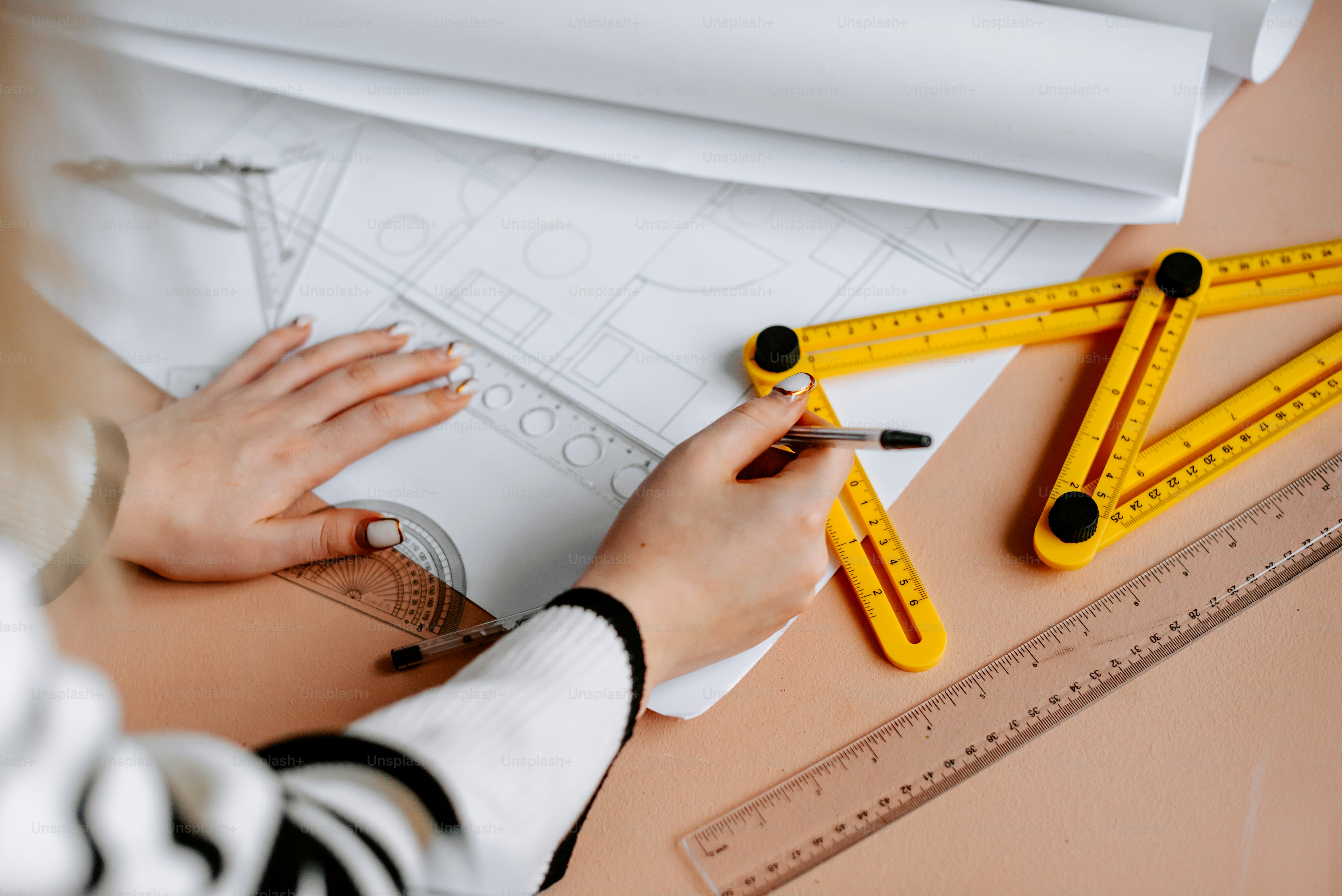 A pair of scissors, rulers, and a ruler on a piece of paper photo ...