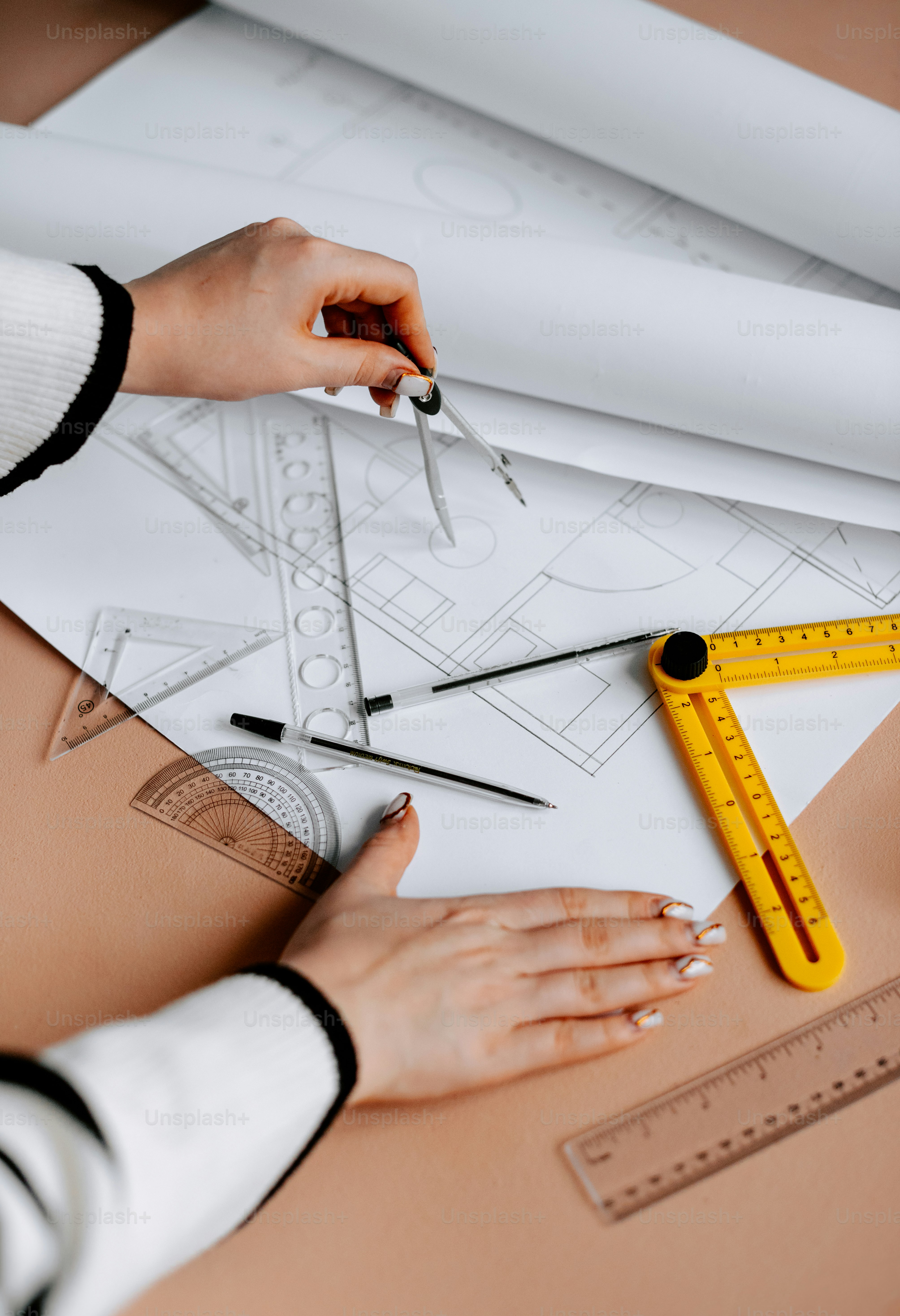 A pair of scissors, rulers, and a ruler on a piece of paper photo ...