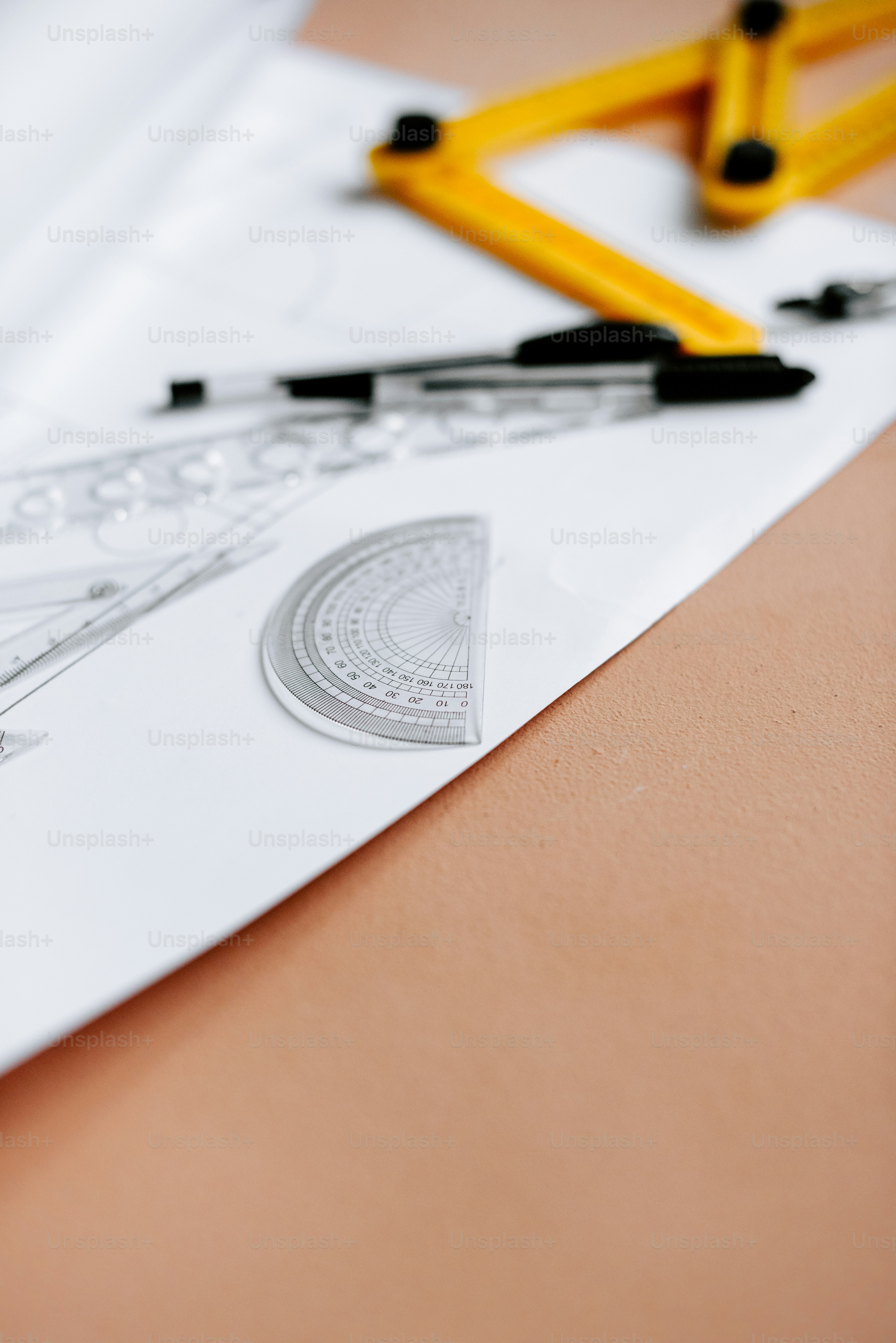 A pair of scissors, rulers, and a ruler on a piece of paper photo ...