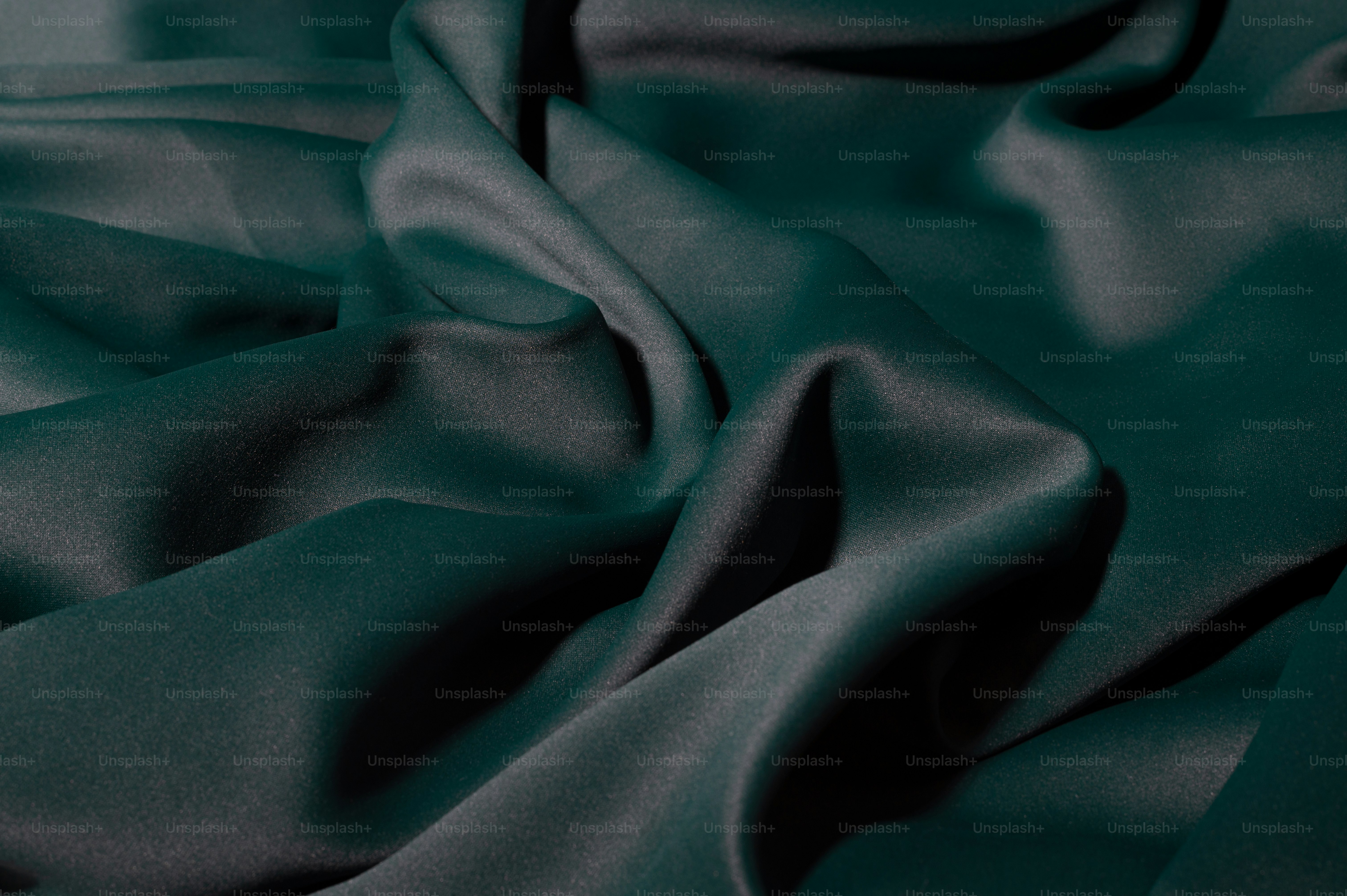 A close up of a dark green fabric photo – Texture Image on Unsplash