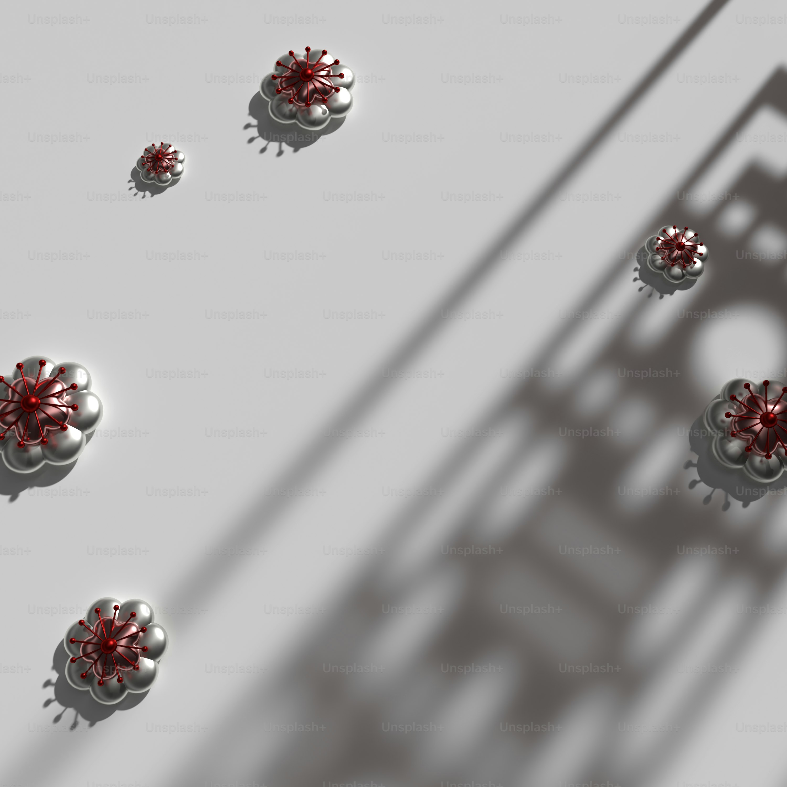 A group of red and white objects on a white surface photo – Background ...