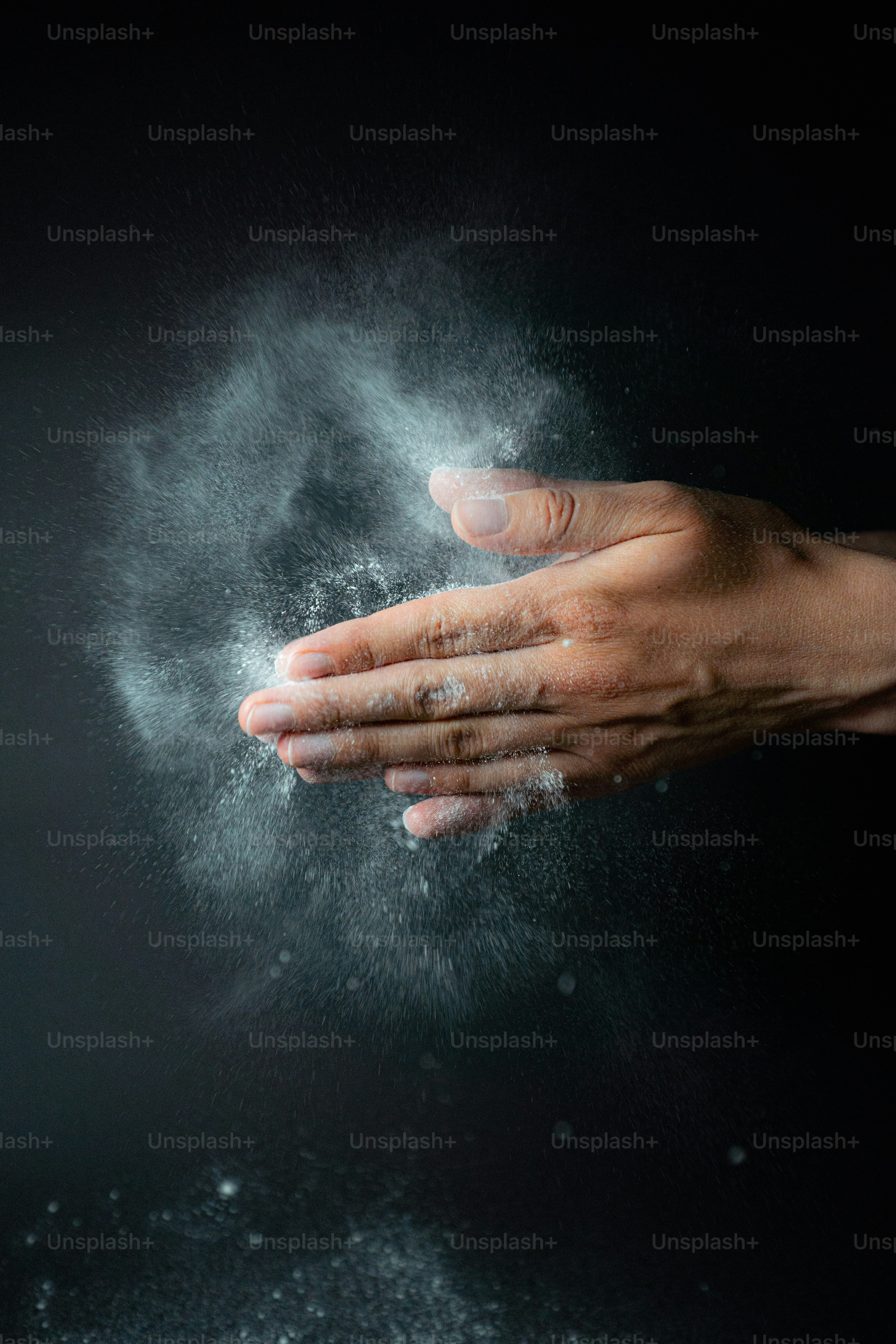 A person's hands are sprinkled with powder photo – Powder Image on Unsplash