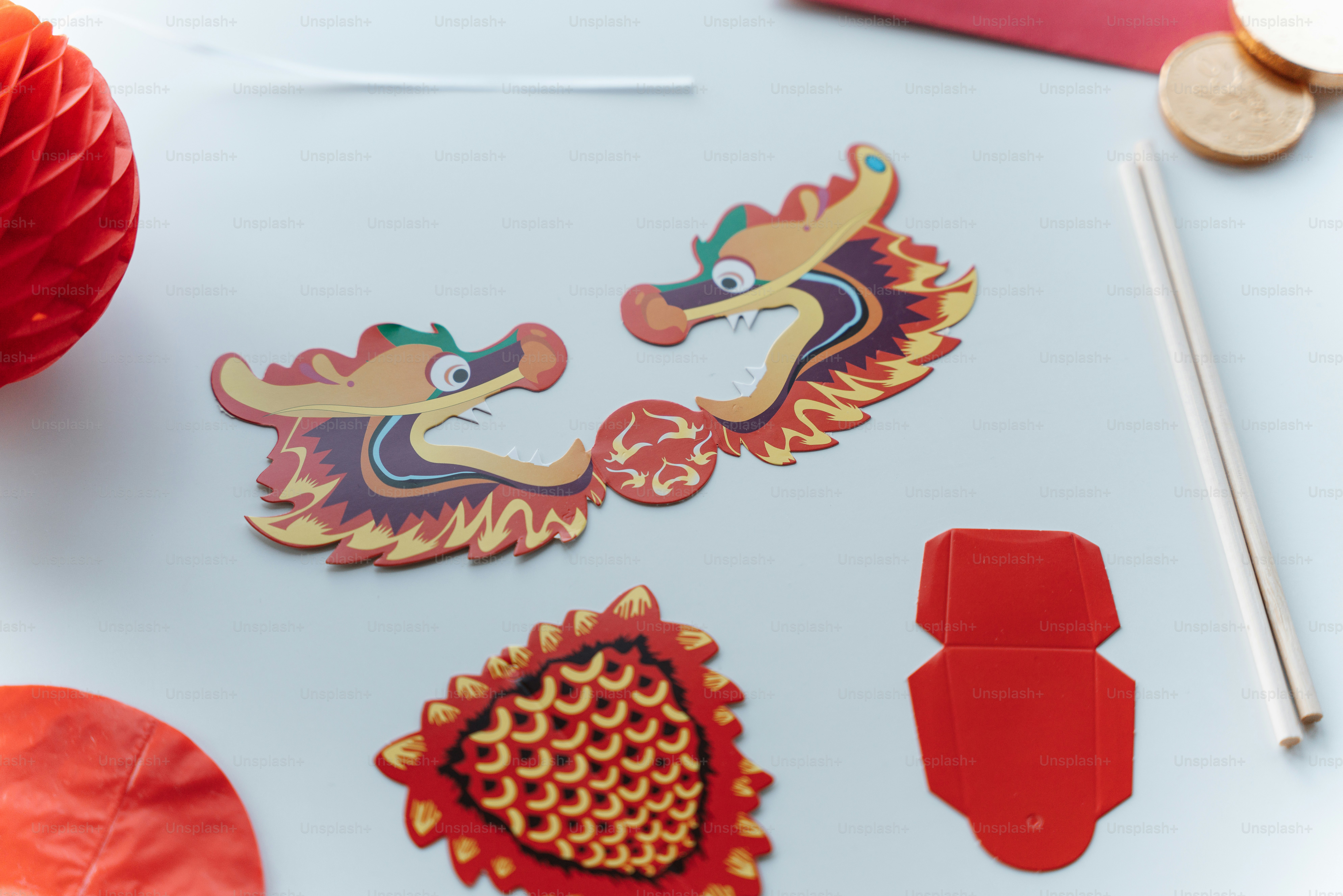 A table topped with paper cut outs and decorations photo – Crafts Image ...
