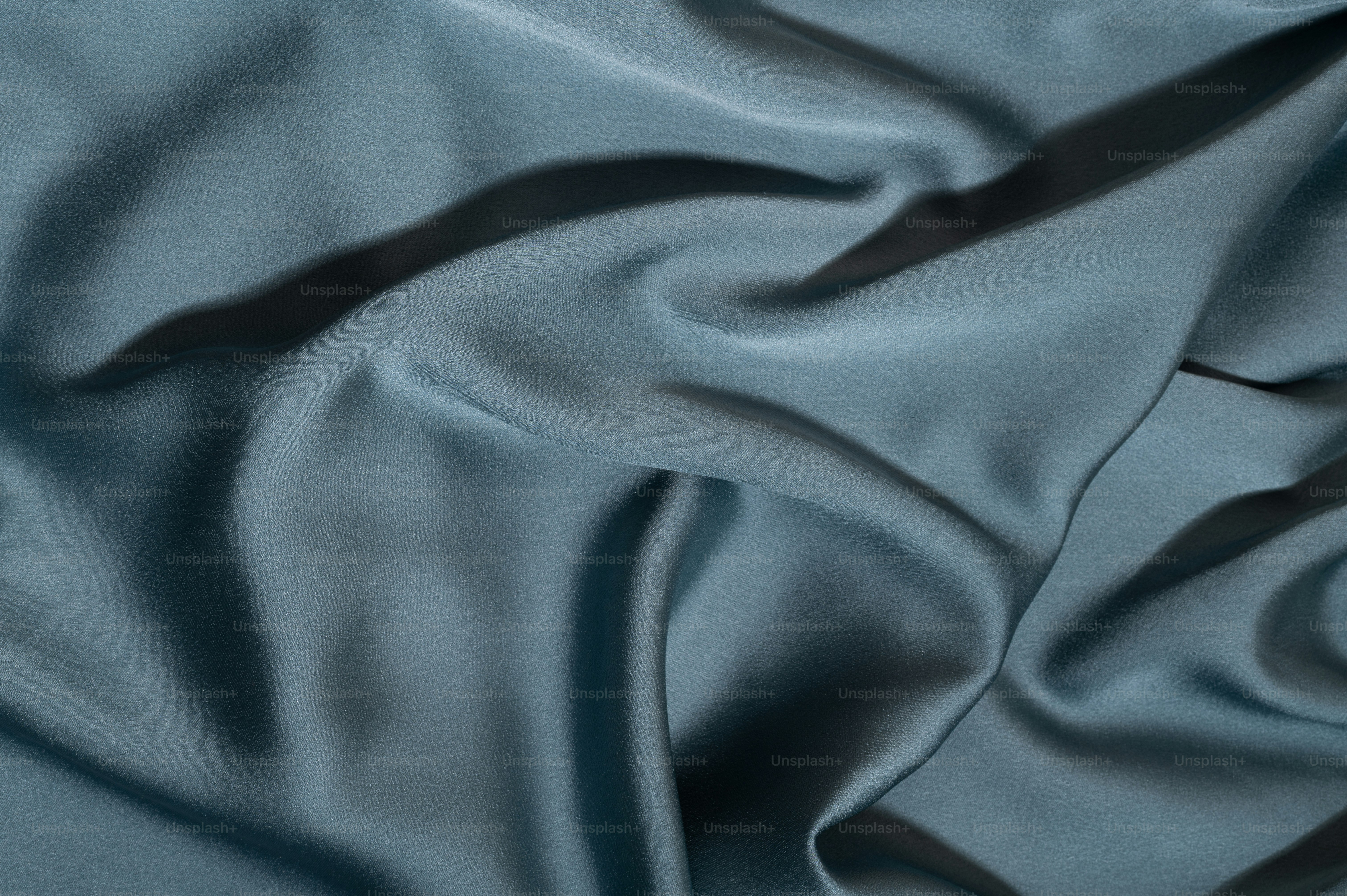 A close up view of a blue fabric photo – Fabric Image on Unsplash