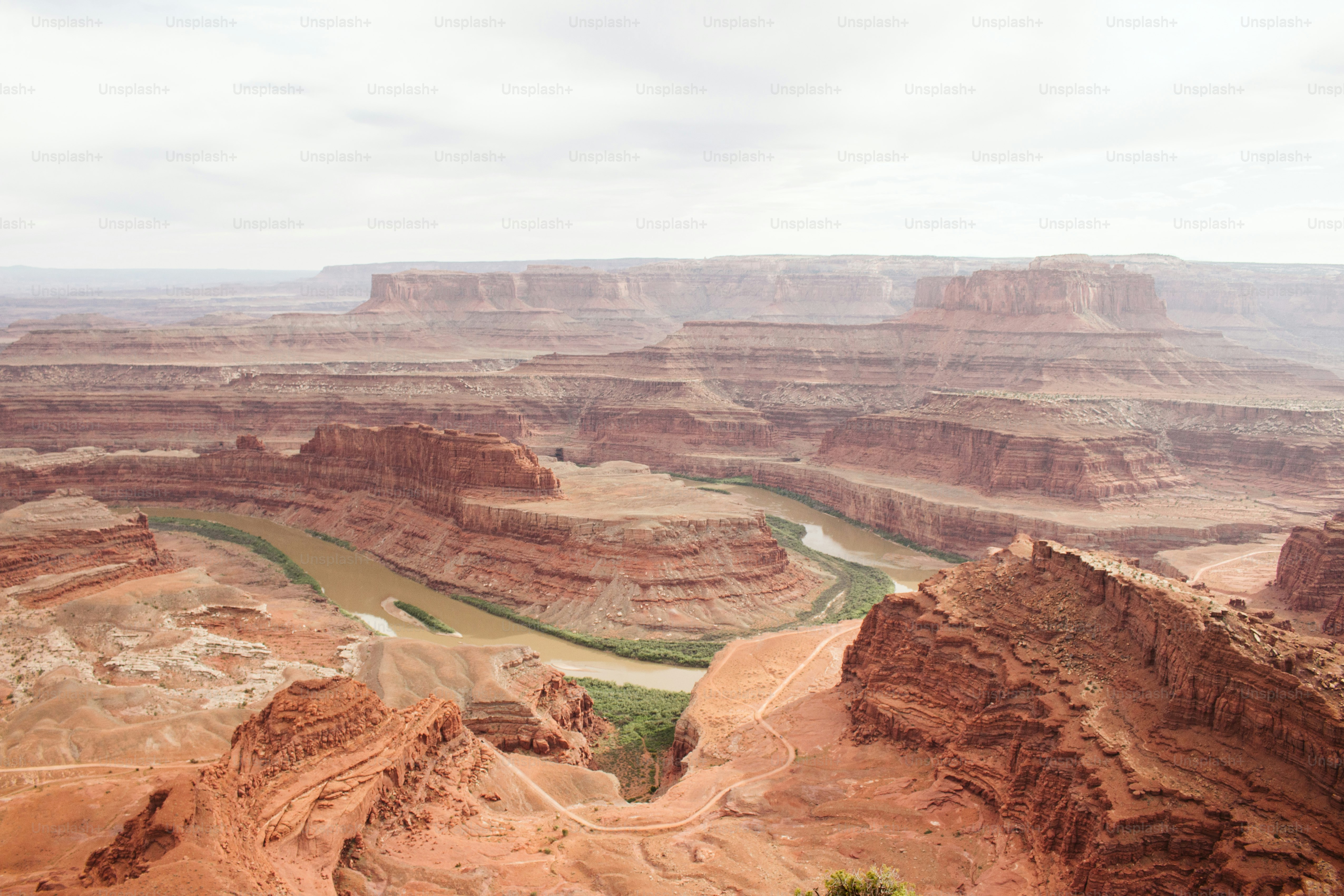 A view of a river in the middle of a canyon photo – Wallpaper Image on ...