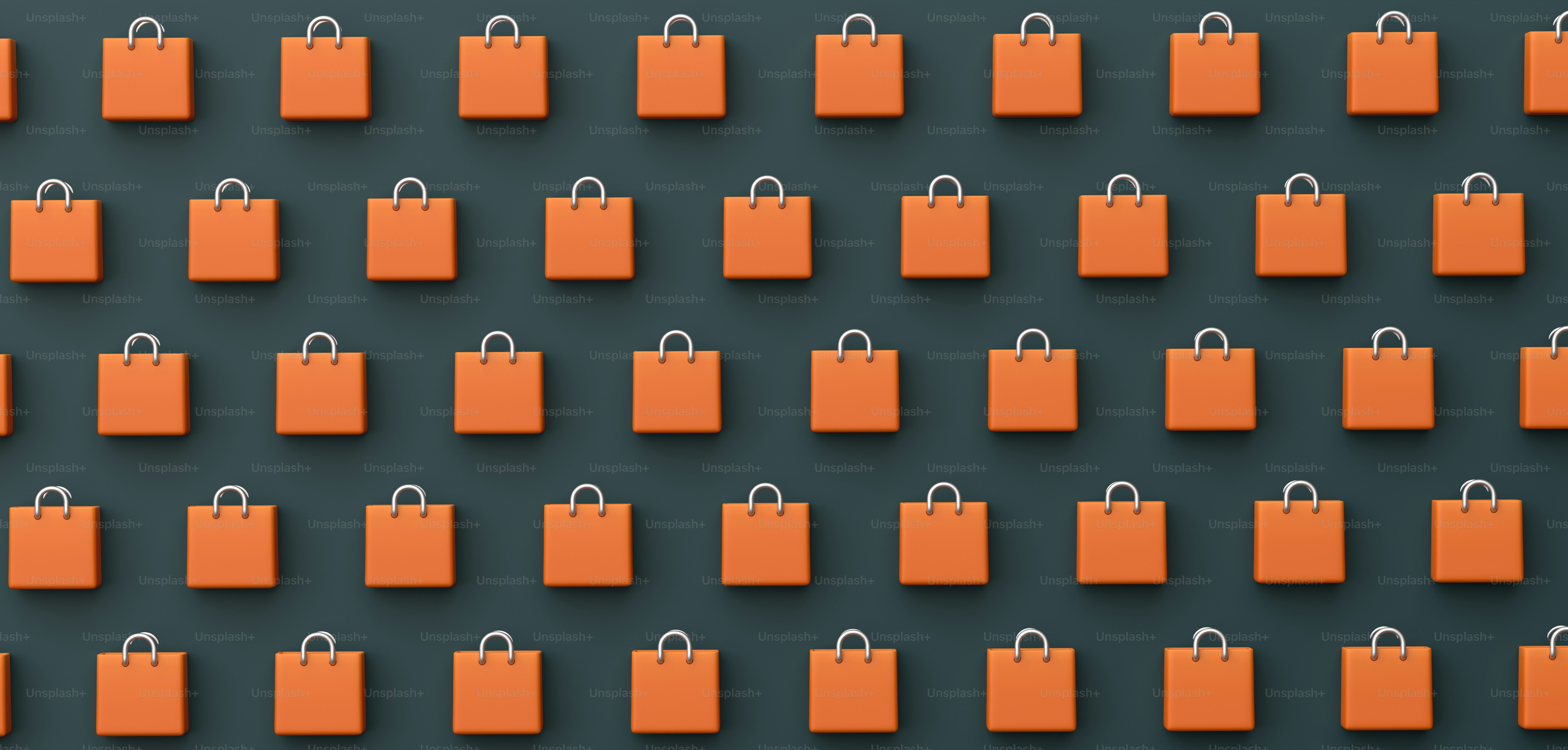 A wall with many orange bags on it photo – Carrier bag Image on Unsplash