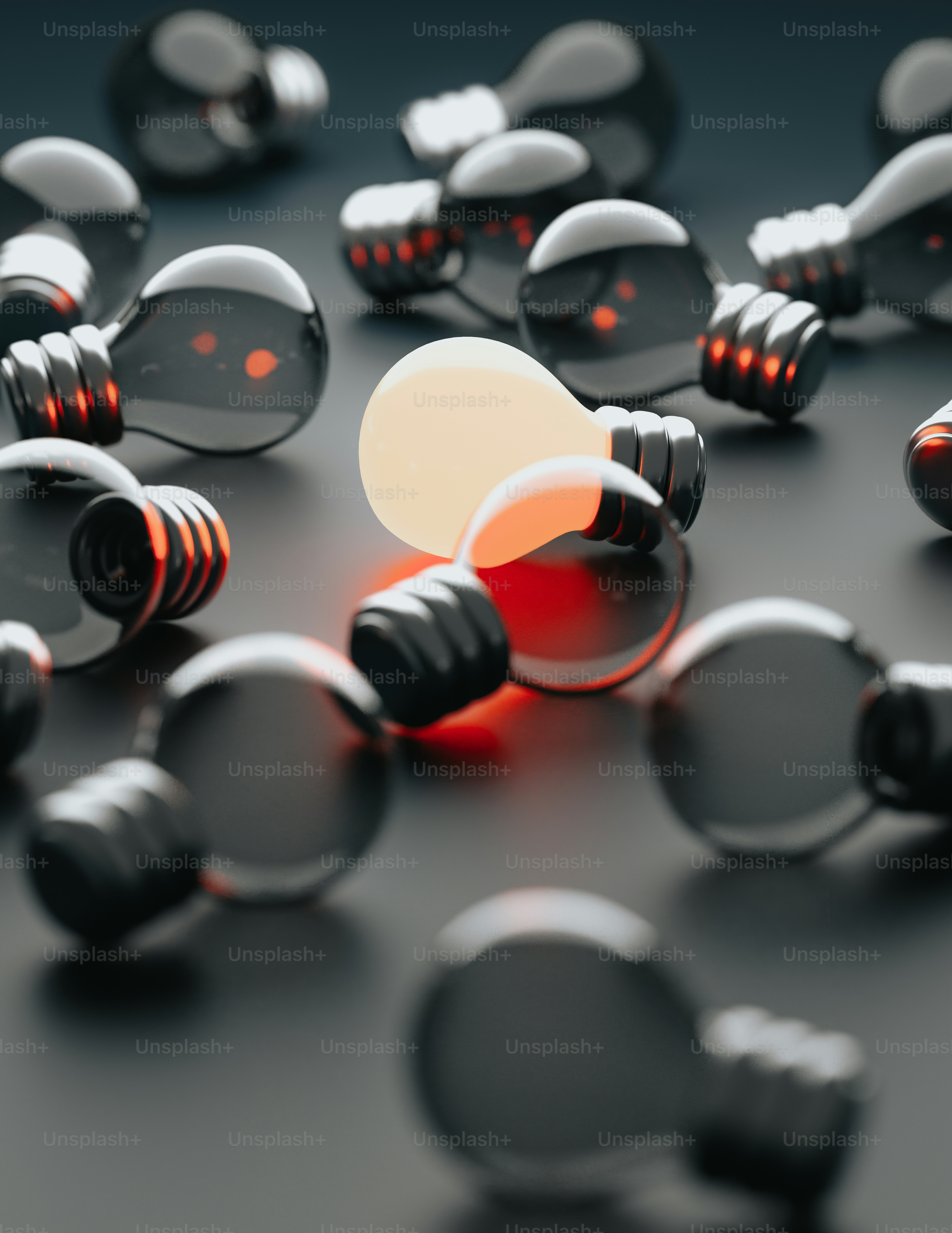 A group of black and red light bulbs photo – Motivate Image on Unsplash