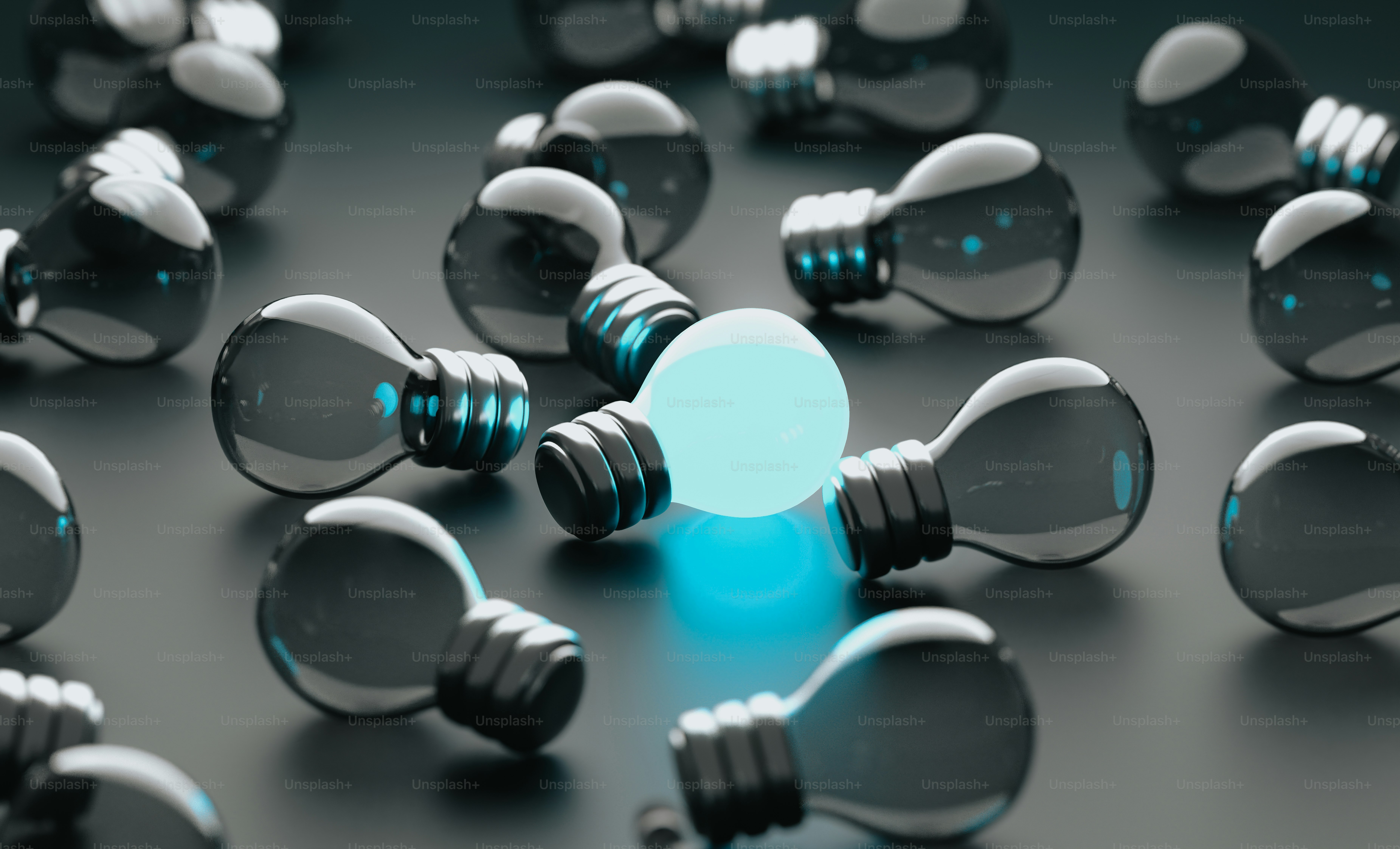 A group of light bulbs sitting on top of a table photo – Wallpaper ...