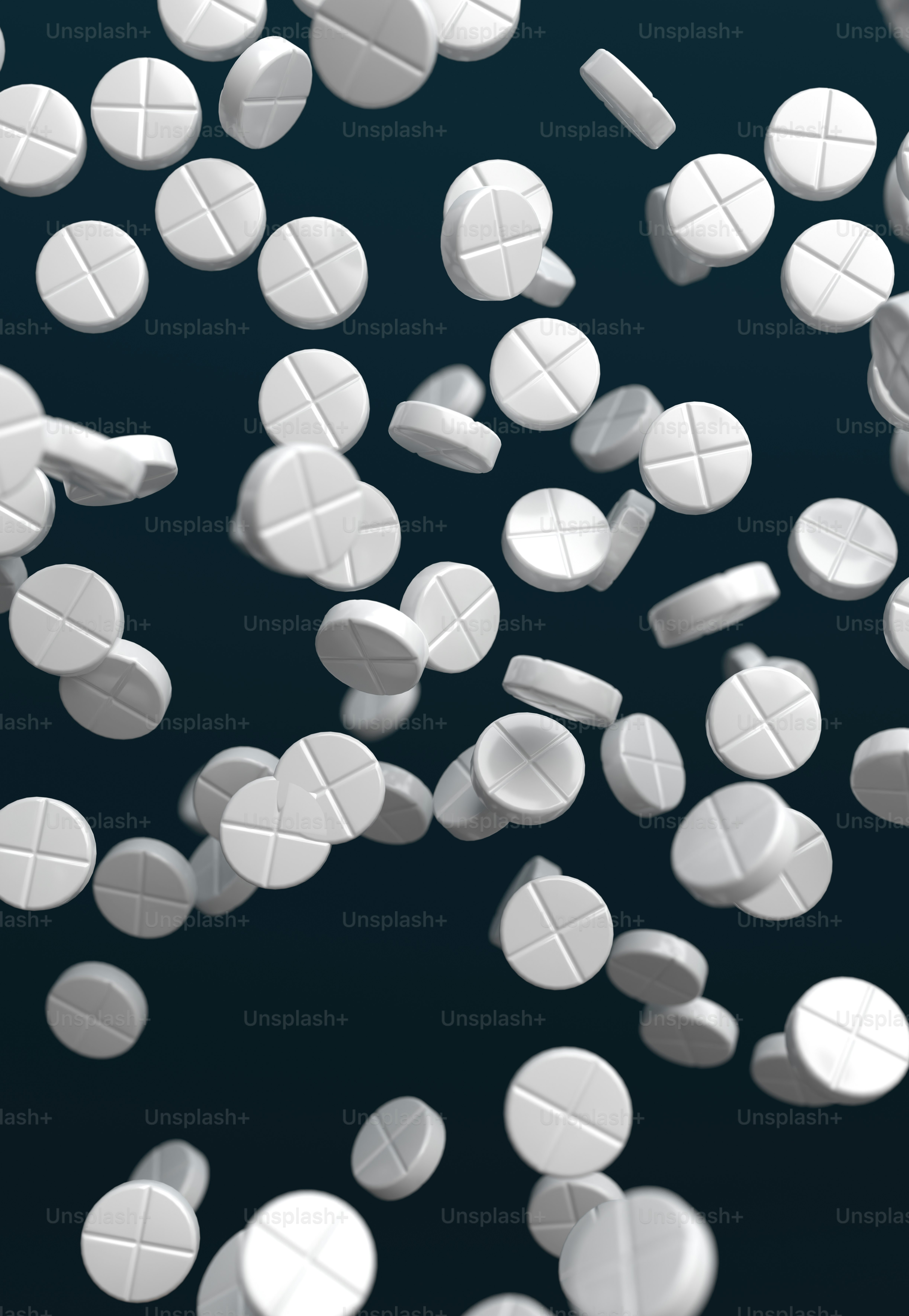 Foto zum Thema Ein Haufen weißer Pillen, die in der Luft schweben ...