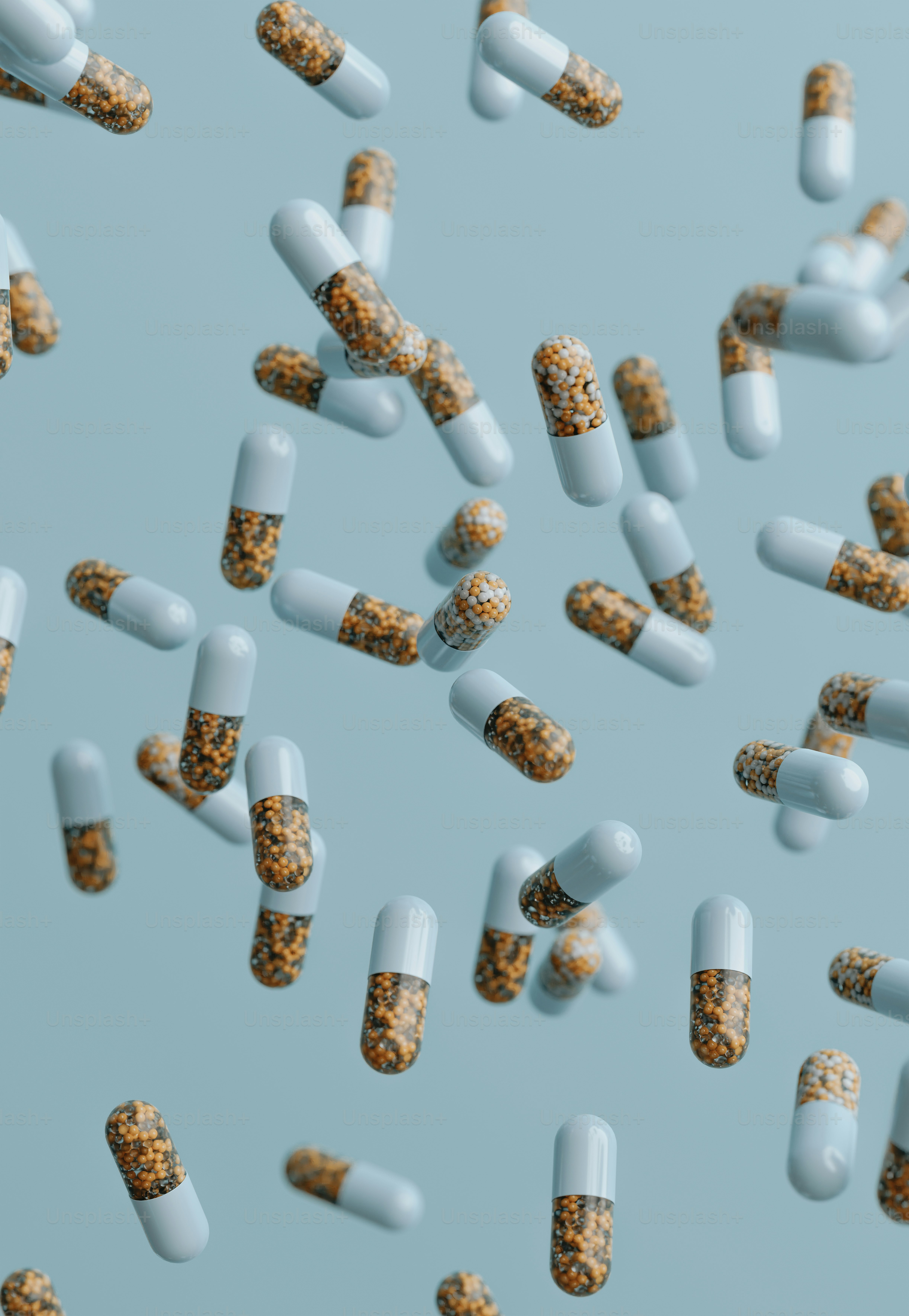 A group of pills floating in the air photo – Medication Image on Unsplash