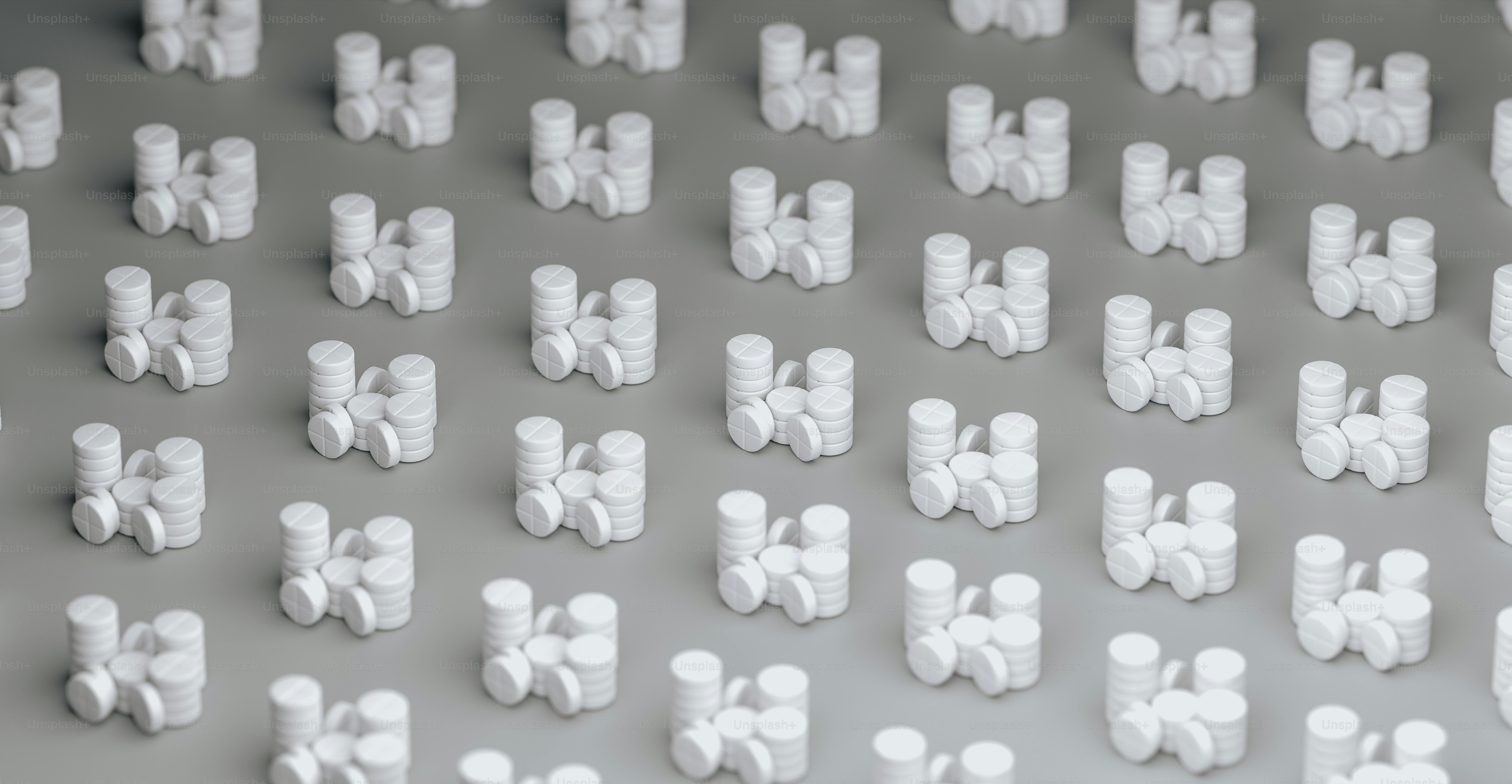 A large group of white plastic objects on a table photo – Medication ...