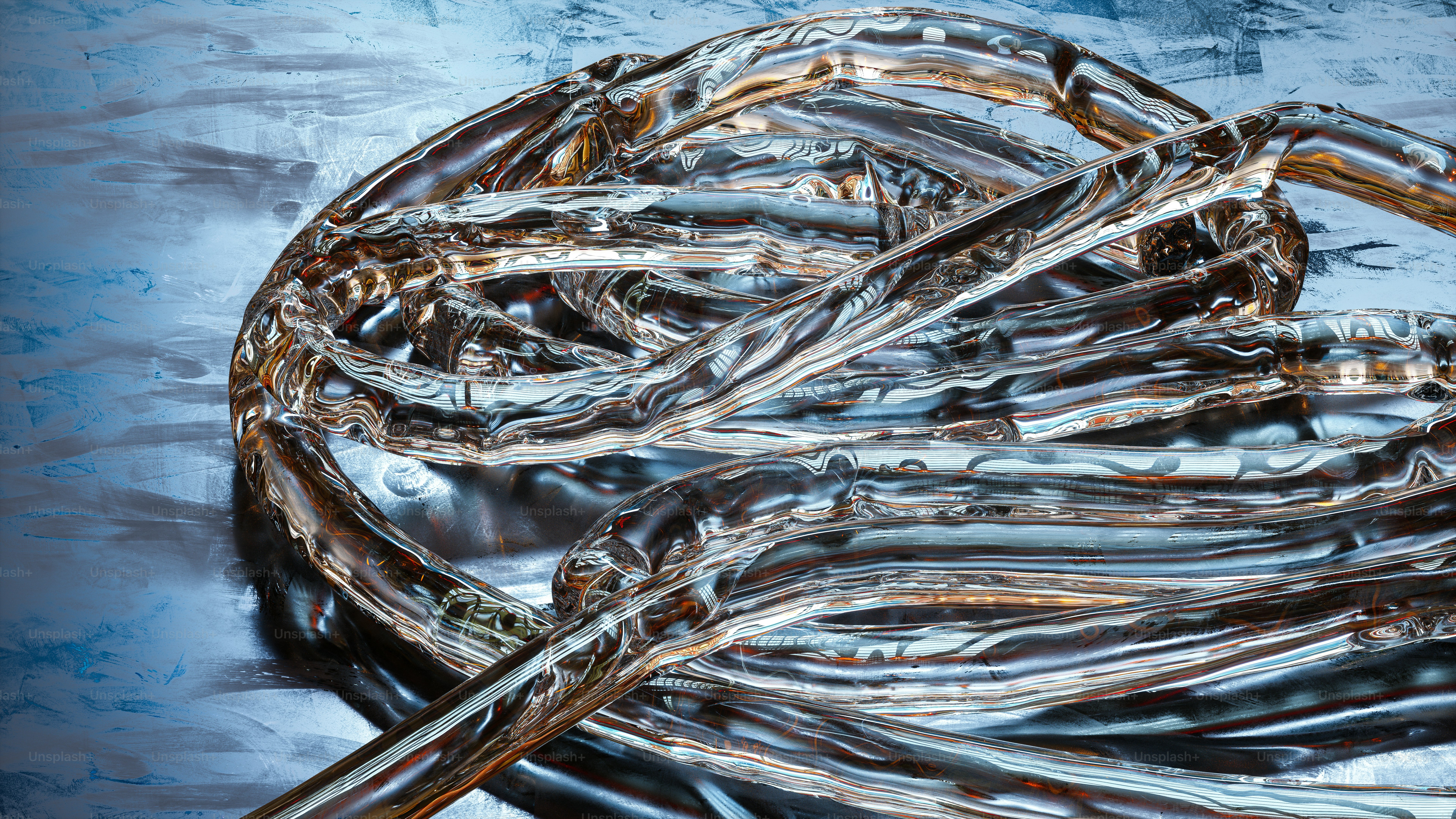 A group of shiny metal objects sitting on top of a table photo ...