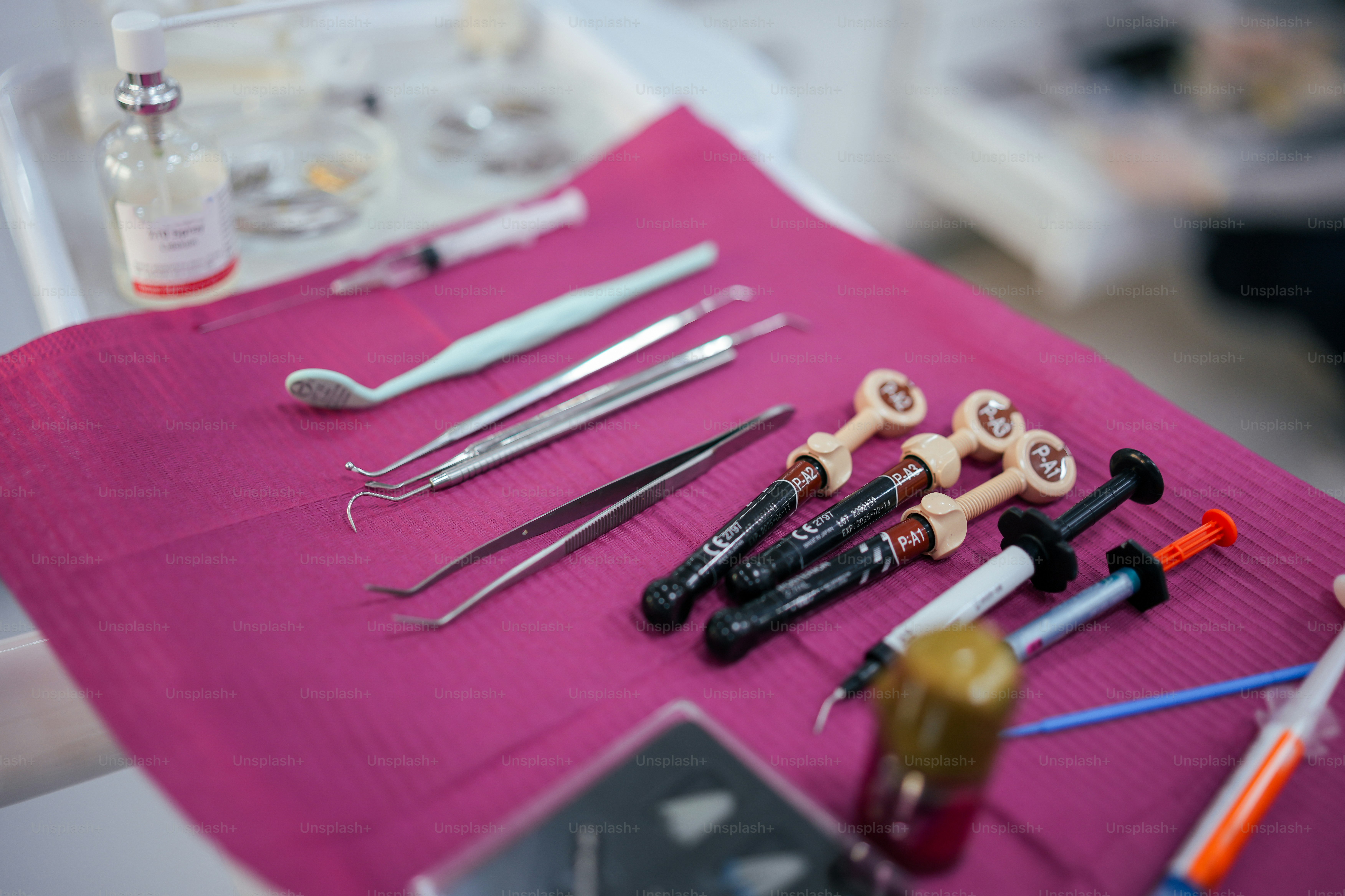 A group of dental instruments sitting on top of a table photo – Health ...