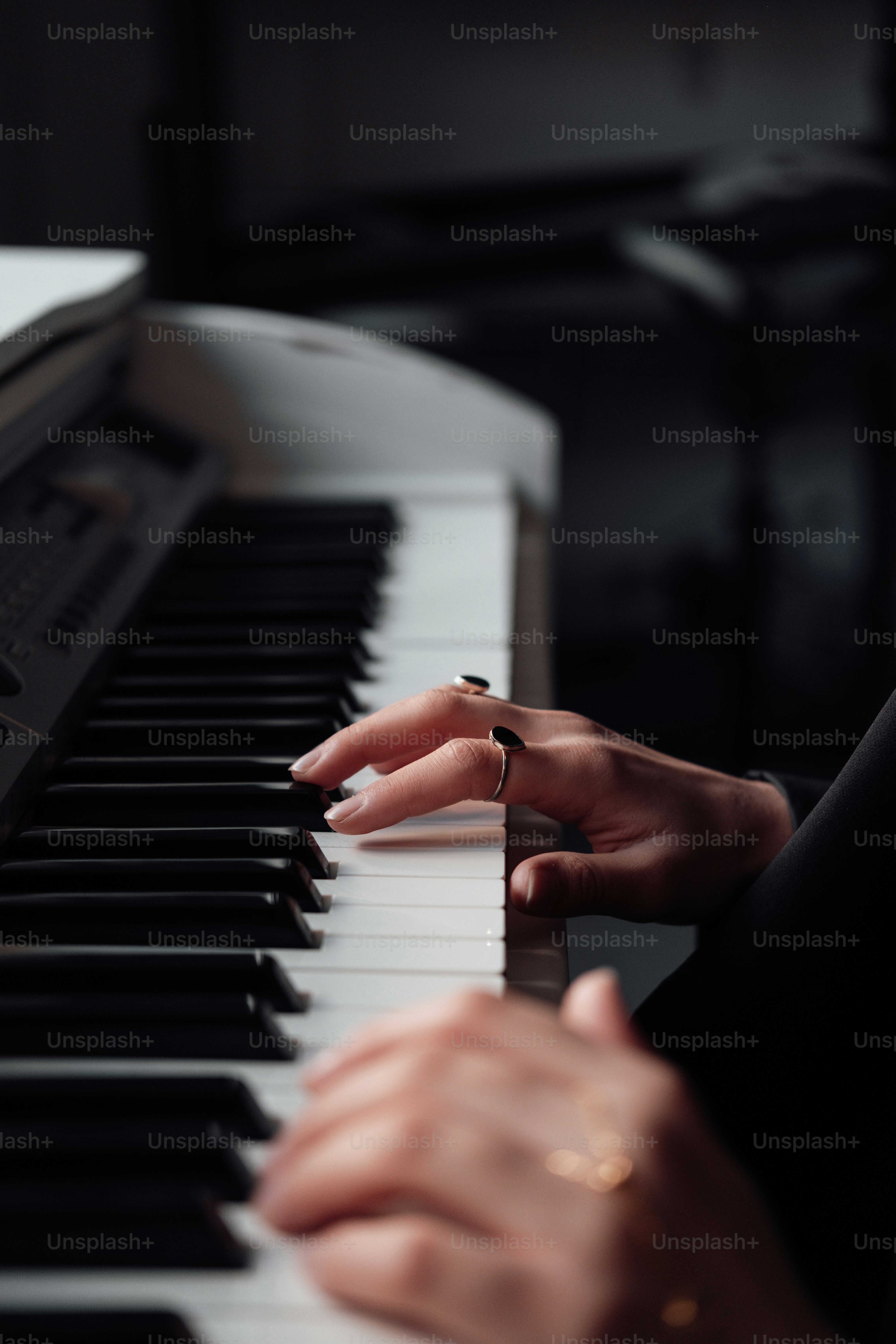 A person playing a piano with their hands photo – The piano Image on ...